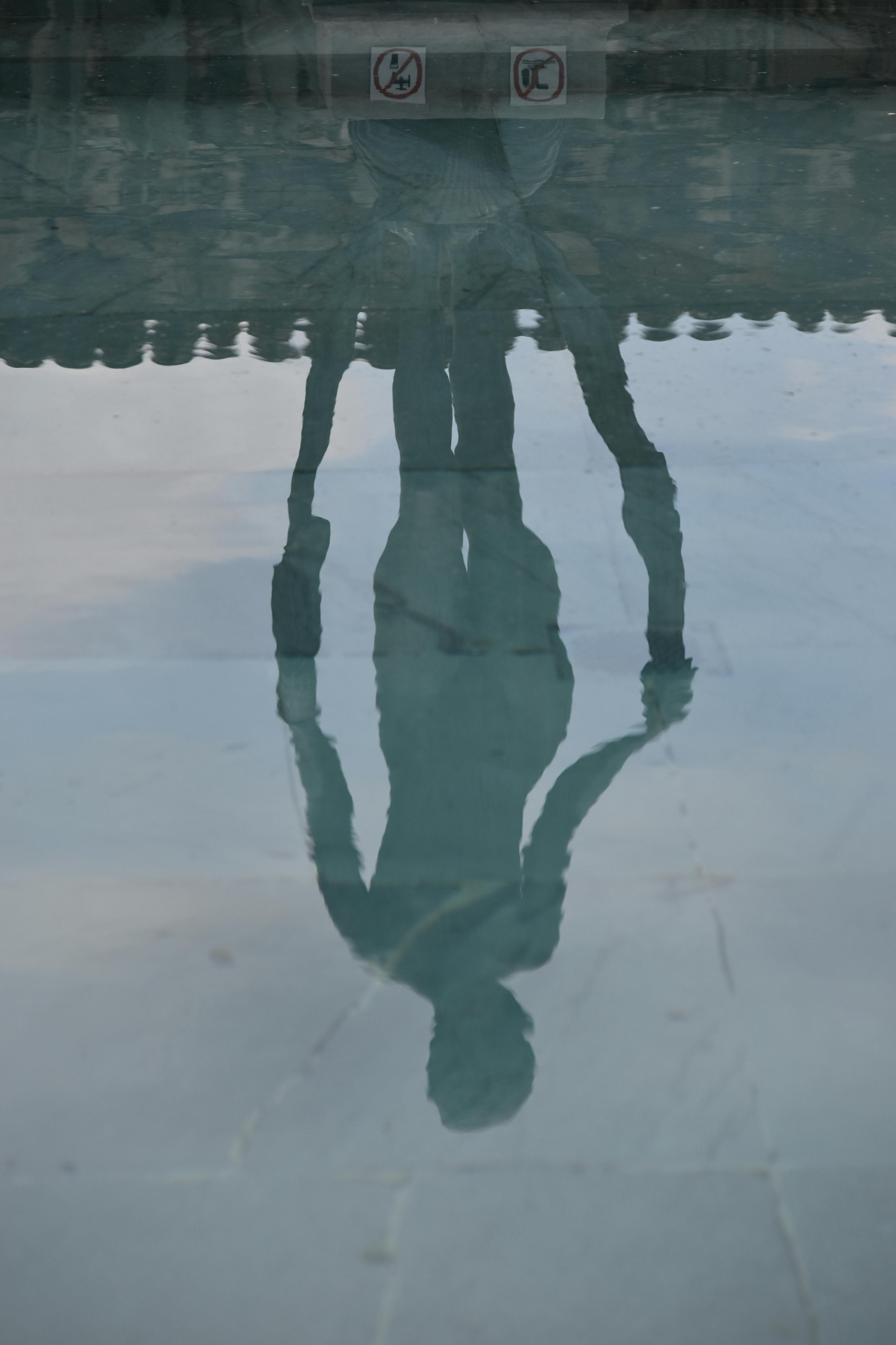 Reflection of a Person on the Water · Free Stock Photo
