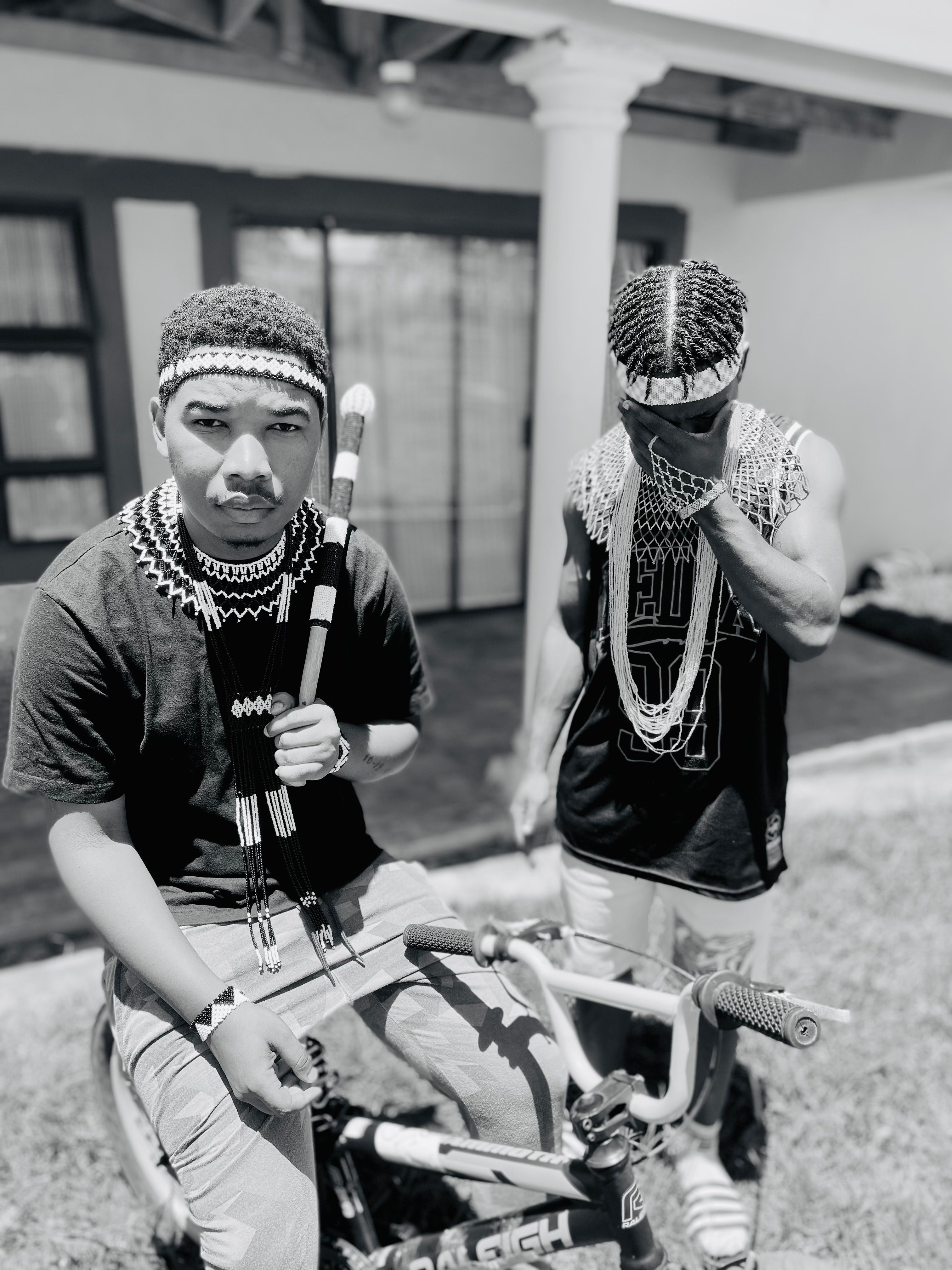 Two Young Men on a Bicycle · Free Stock Photo