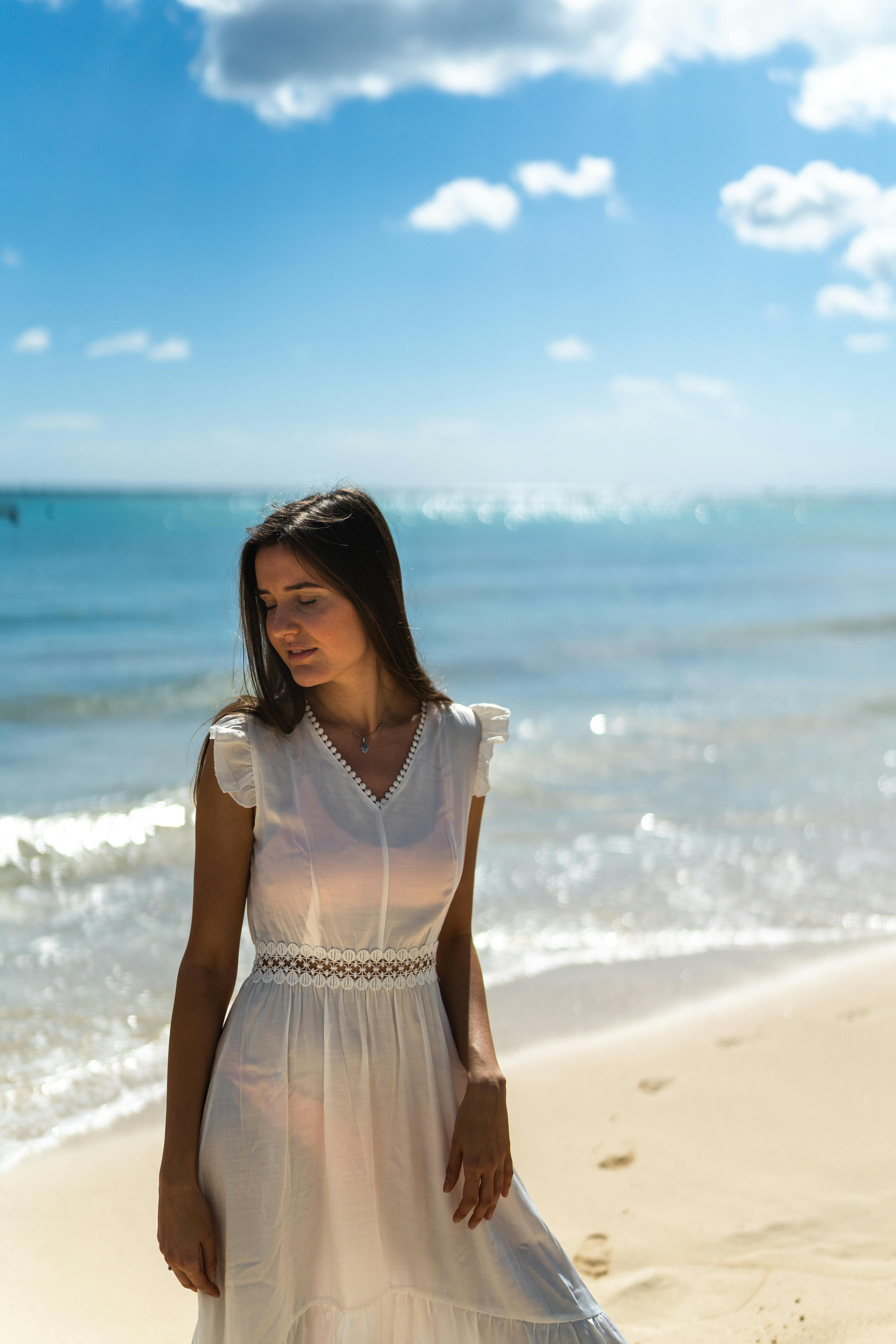 Woman Wearing Dress on a Beach · Free Stock Photo