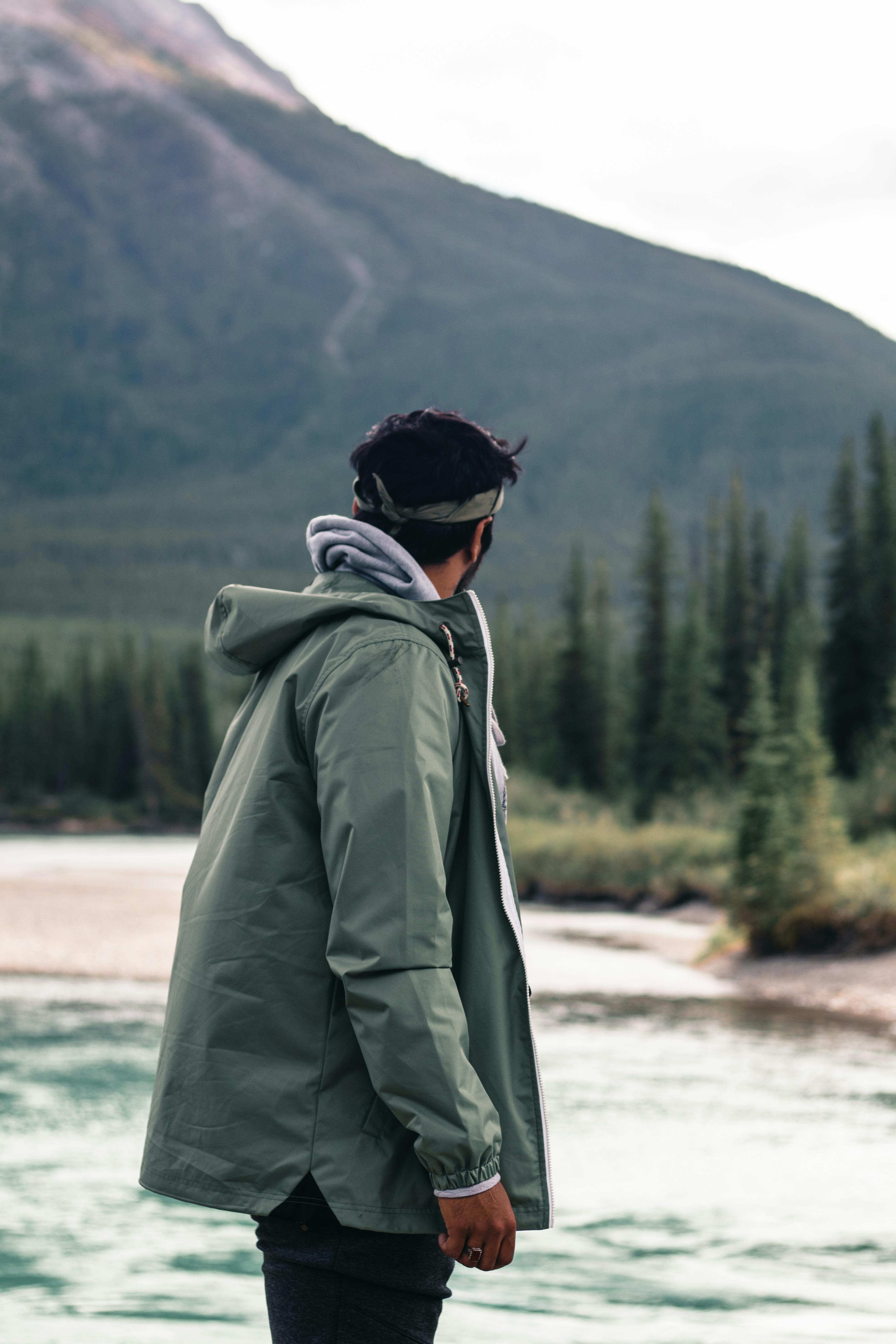 Photograph of a Man Wearing a Green Jacket · Free Stock Photo