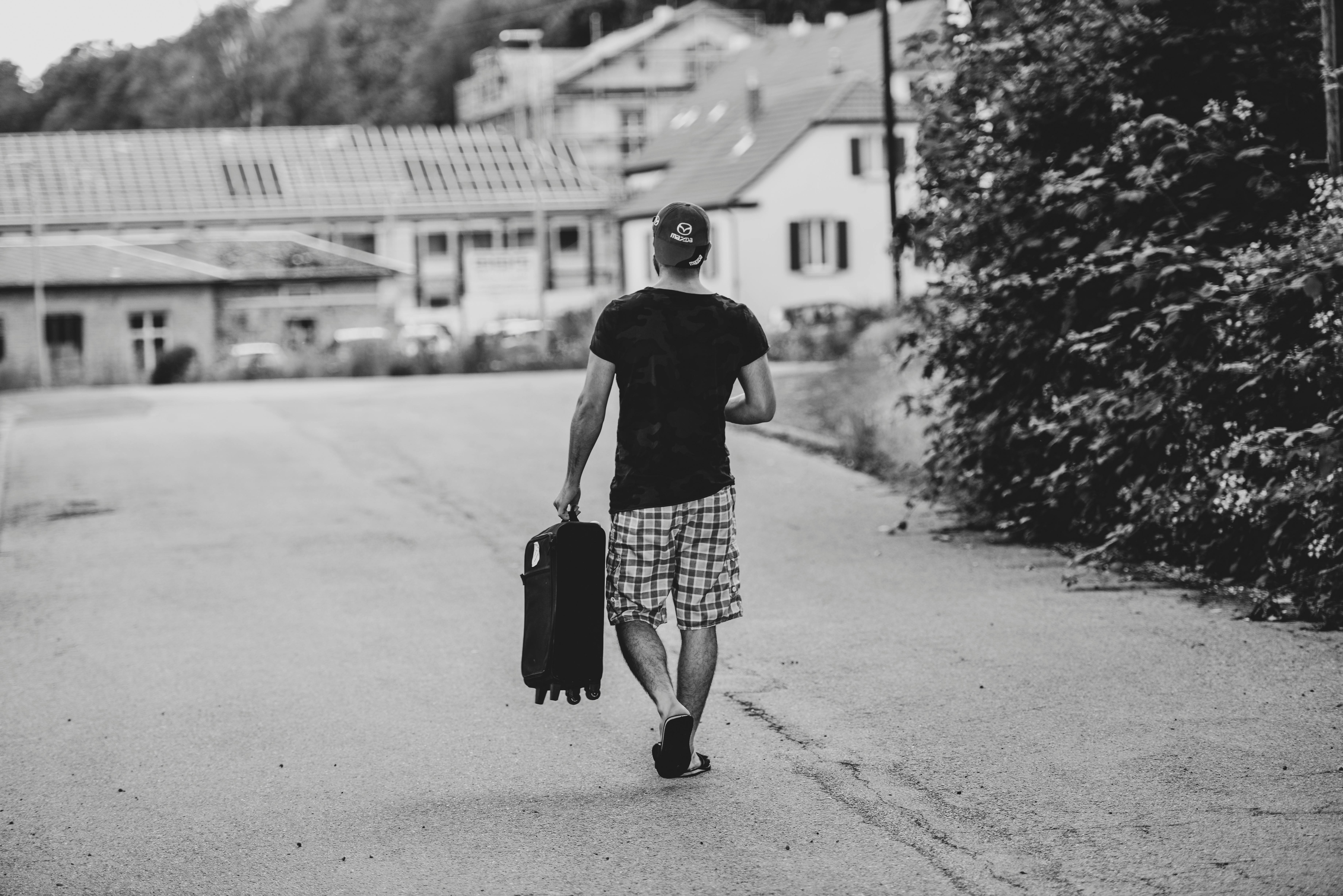 Backview of Man waking on Road · Free Stock Photo