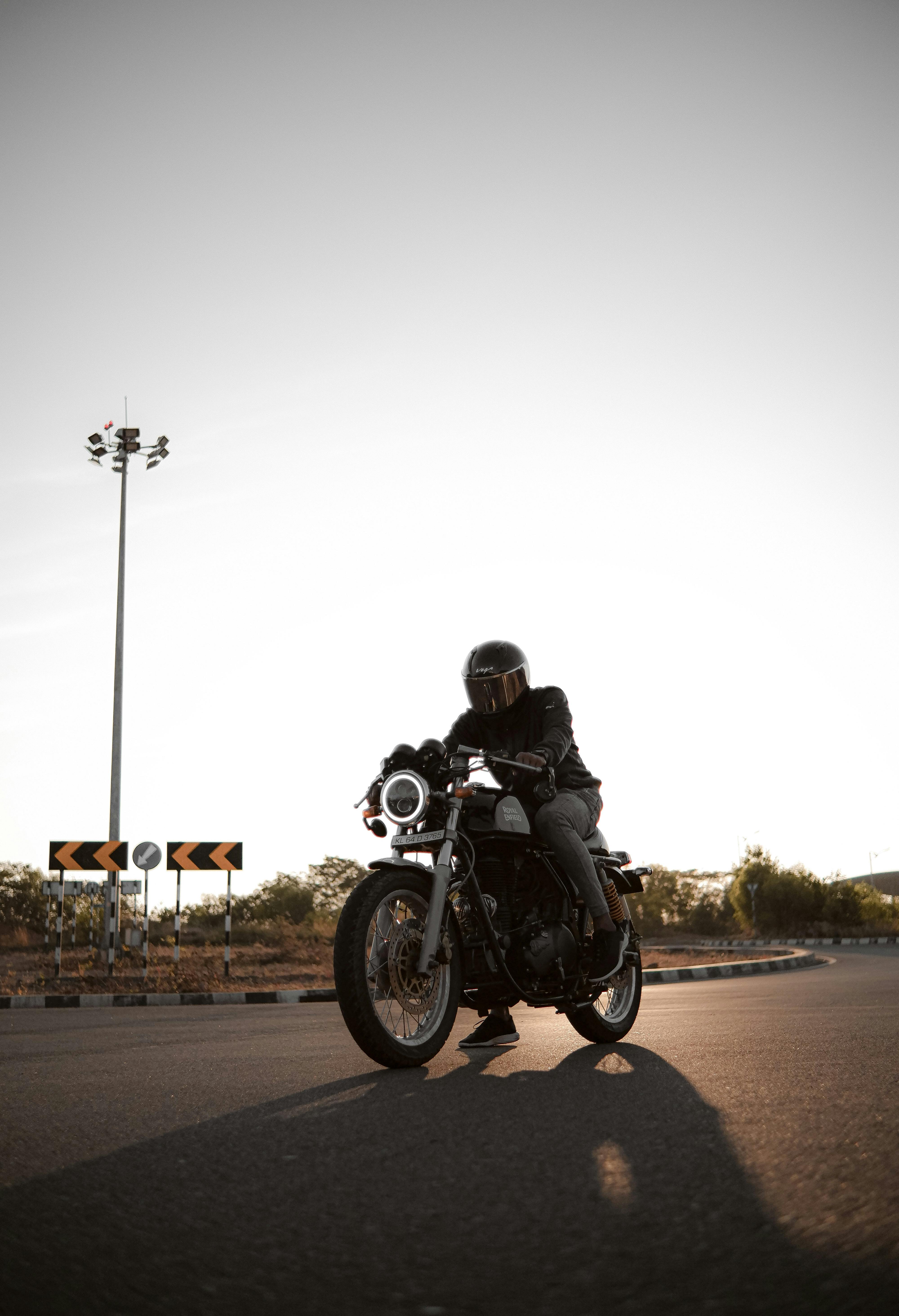 Close-Up Shot of a Person Riding a Motorcycle · Free Stock Photo