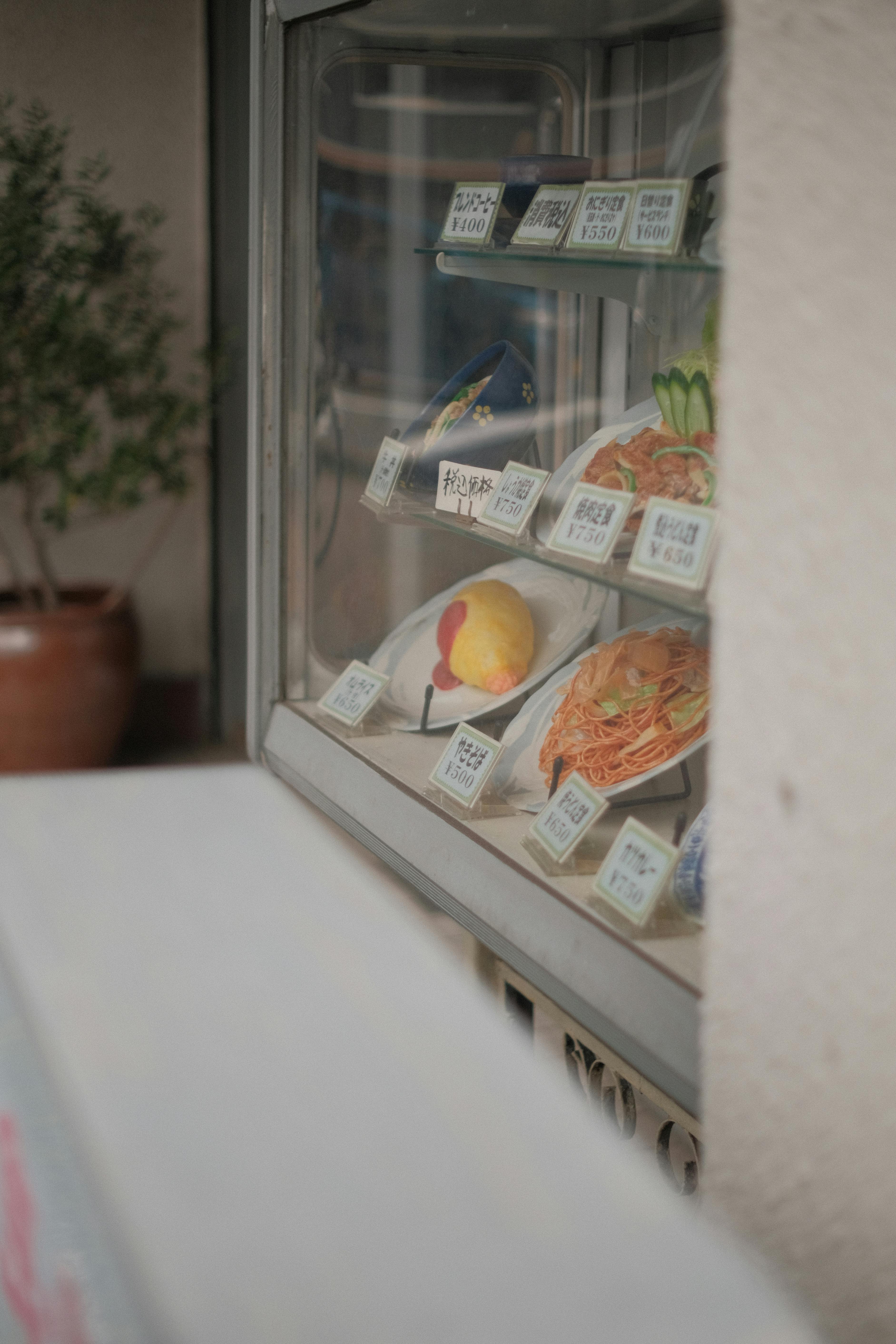 Foods on Display Window · Free Stock Photo