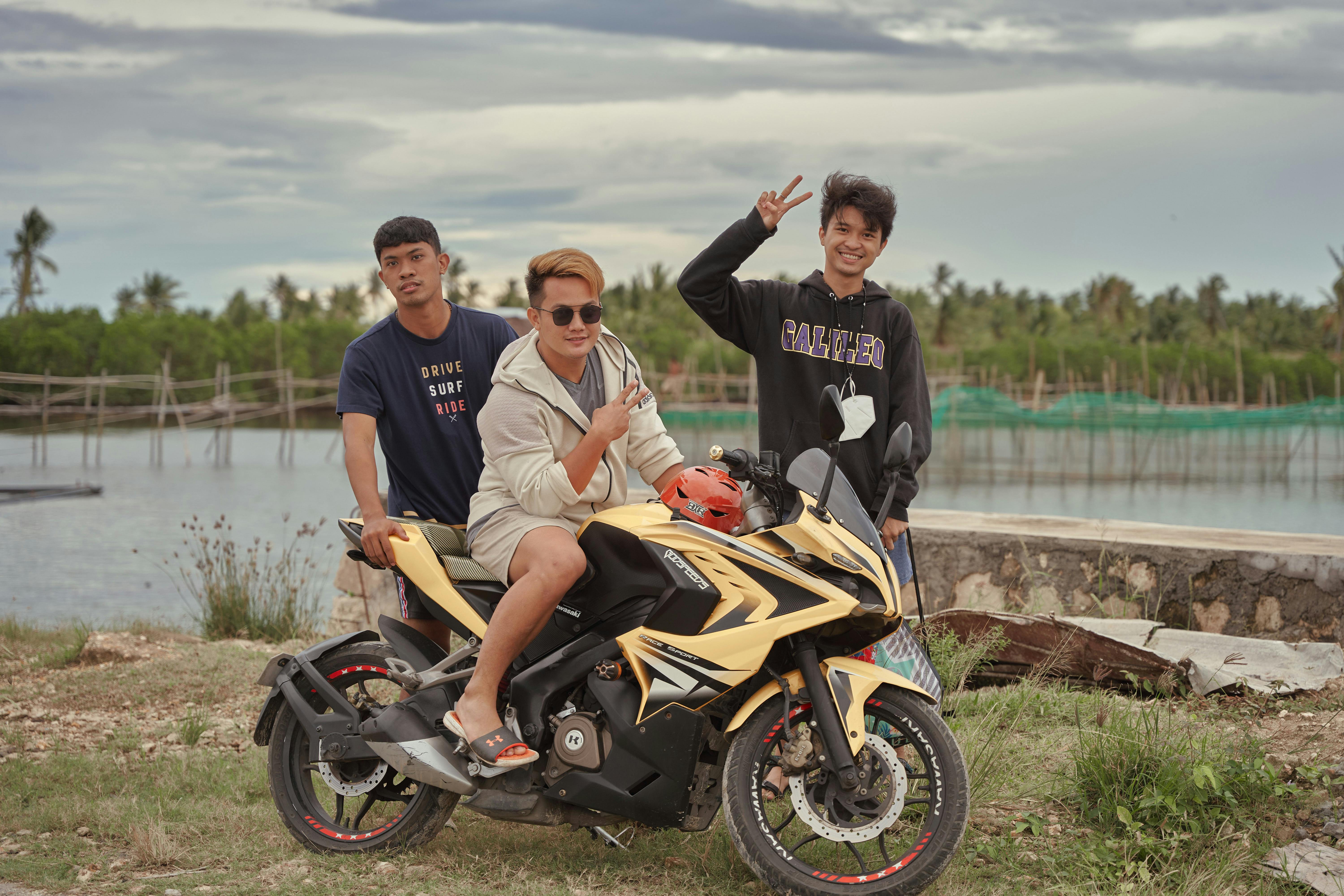 Two Boys Riding a Motorcycle · Free Stock Photo