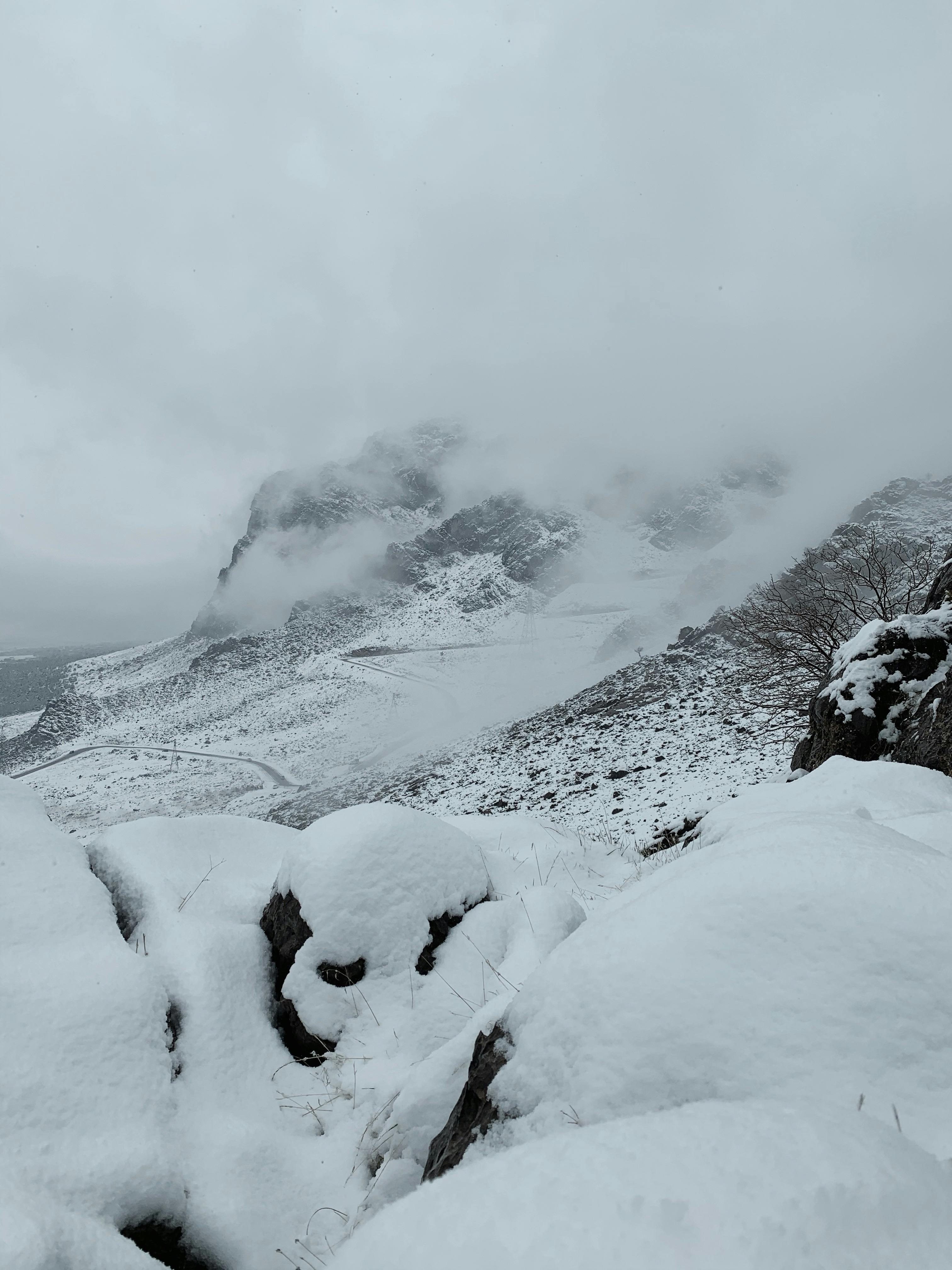 Thick Fog over the Snow Covered Mountain · Free Stock Photo