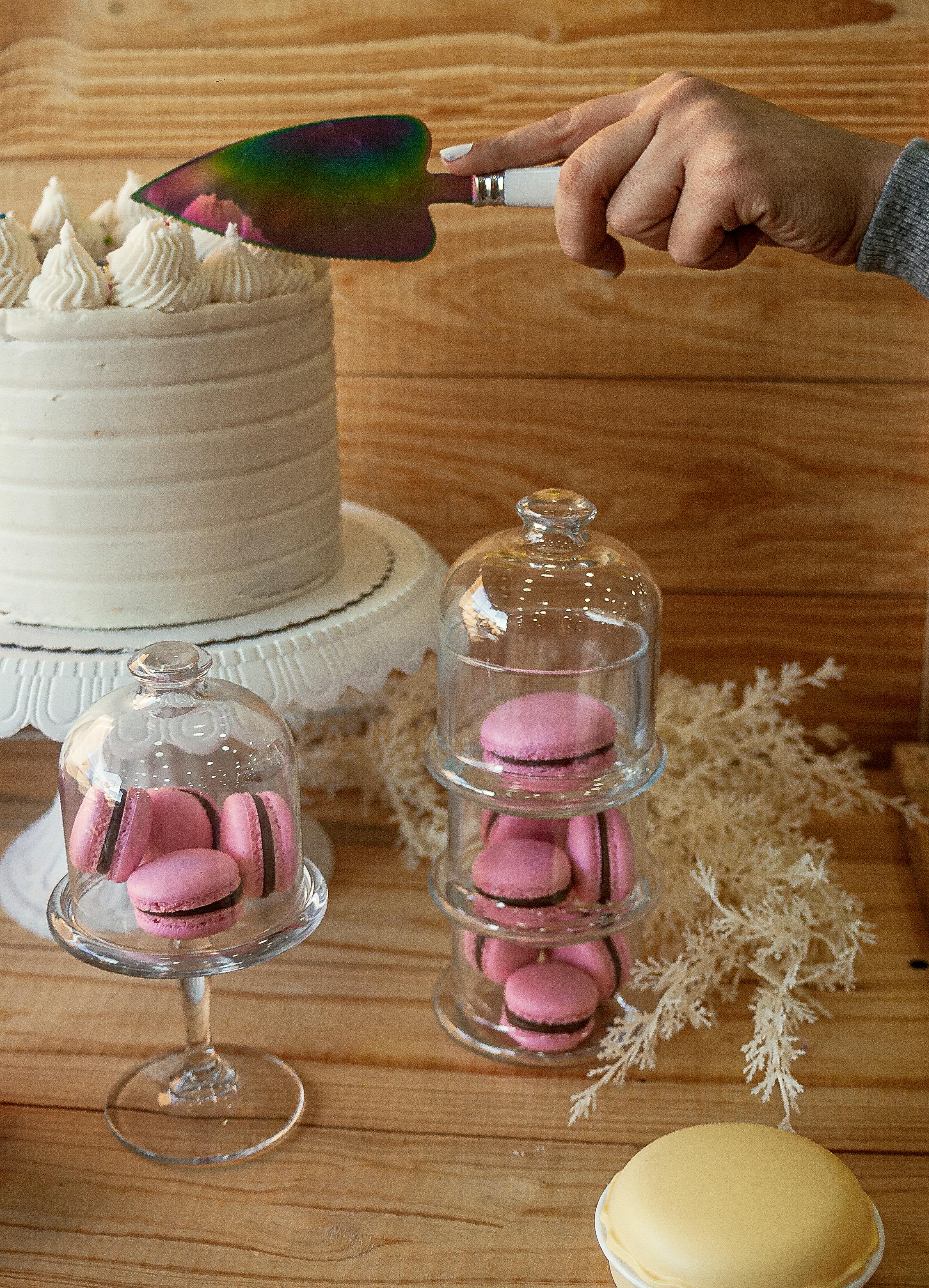 Hand Slicing a Cake · Free Stock Photo