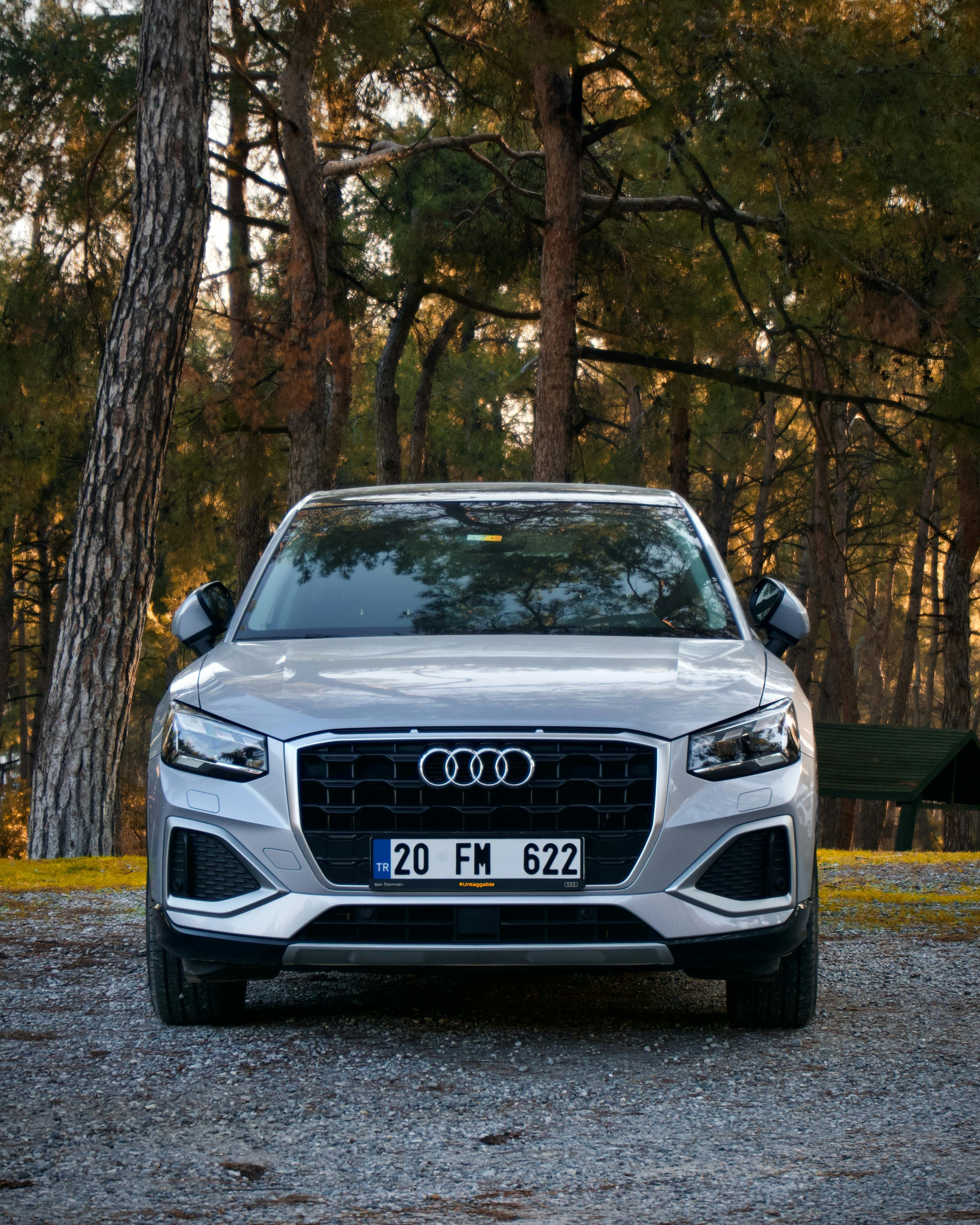Gray Audi Q2 Sport Car near Tall Trees · Free Stock Photo