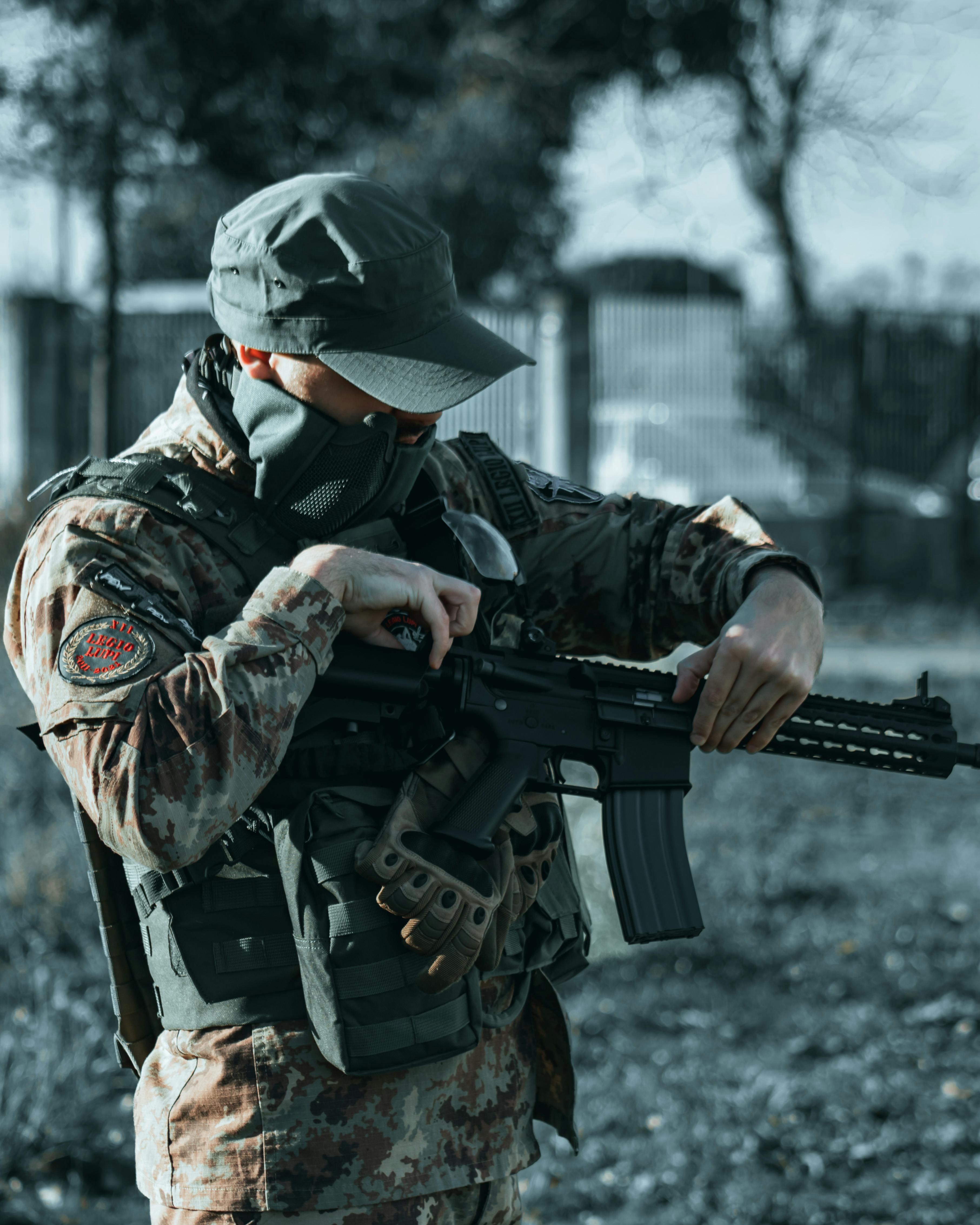 Soldier Wearing Brown Helmet Holding Assault Rifle during Daytime ...