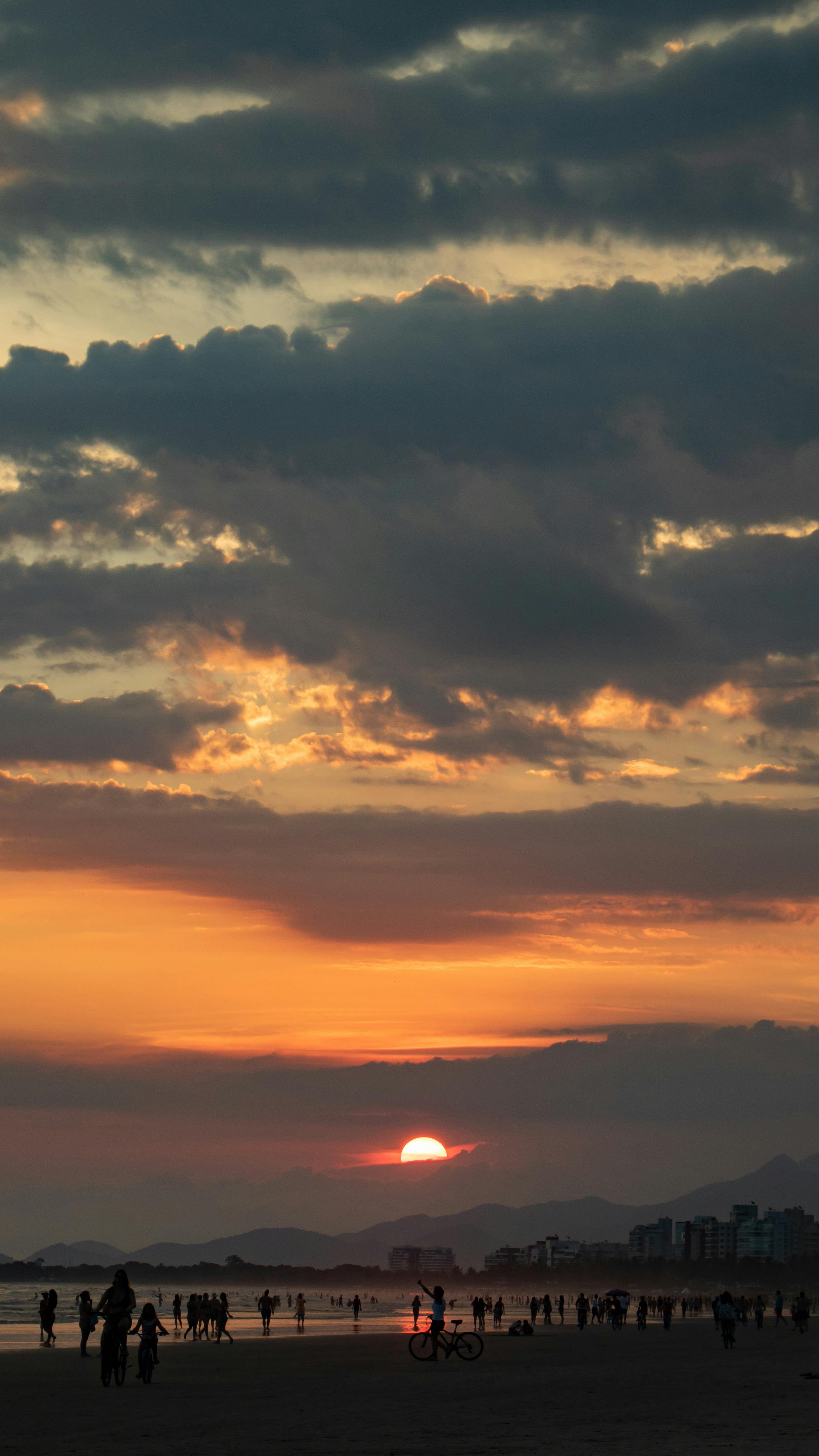 People on Beach at Sunset · Free Stock Photo