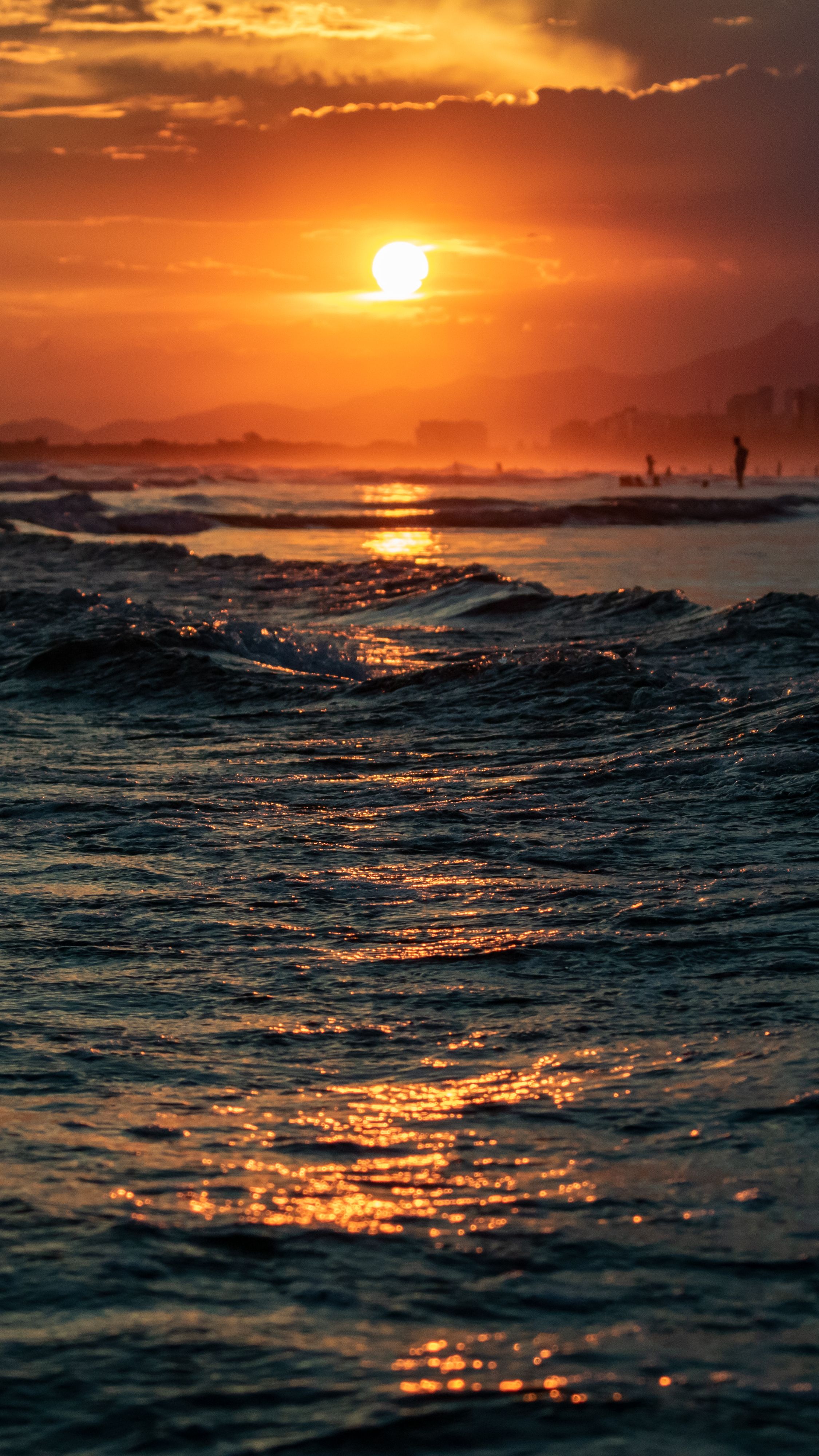 Sunset Over Sea Waves · Free Stock Photo