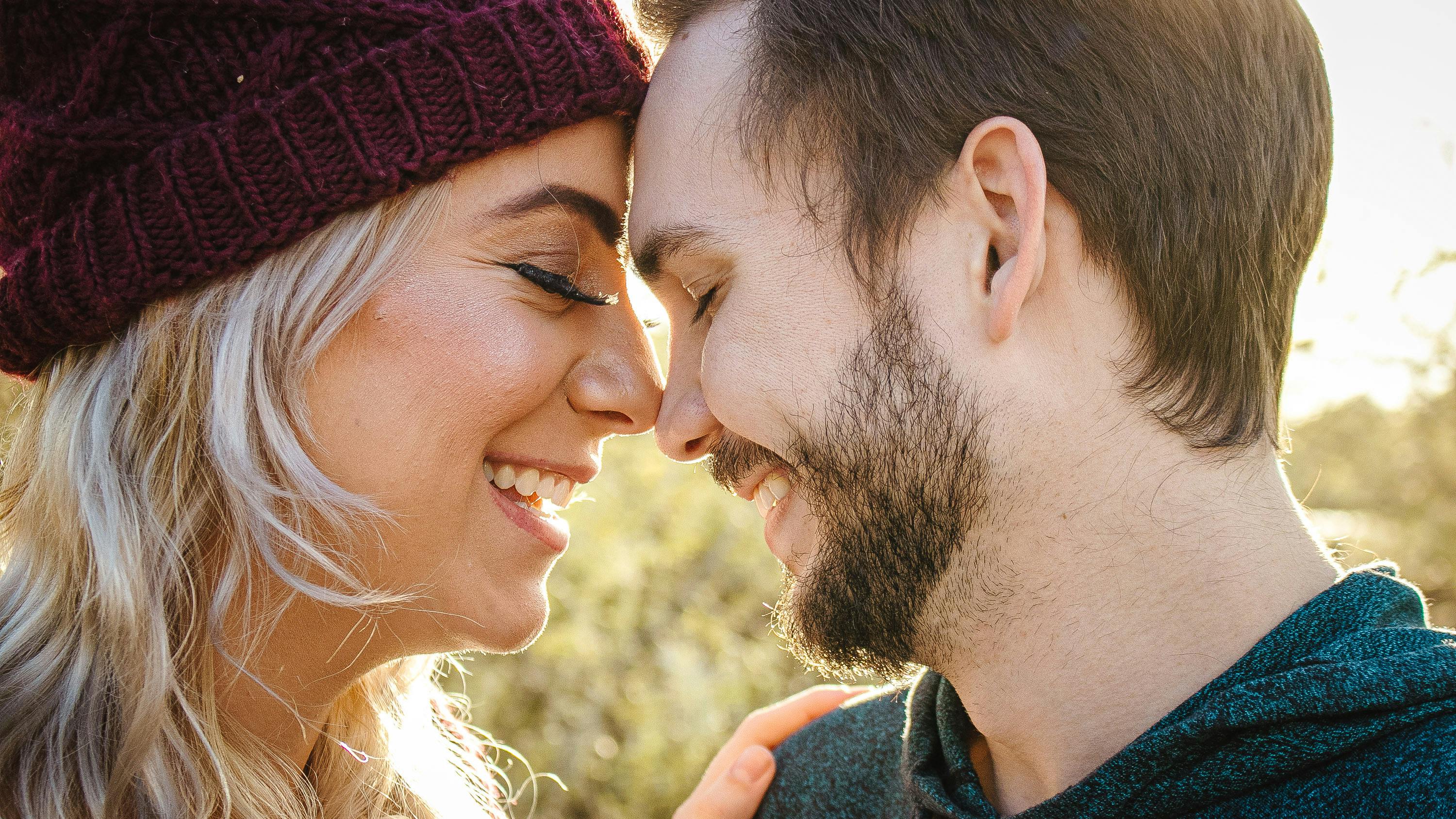 Close-Up Photo of a Woman Touching a Man's Cheek · Free Stock Photo