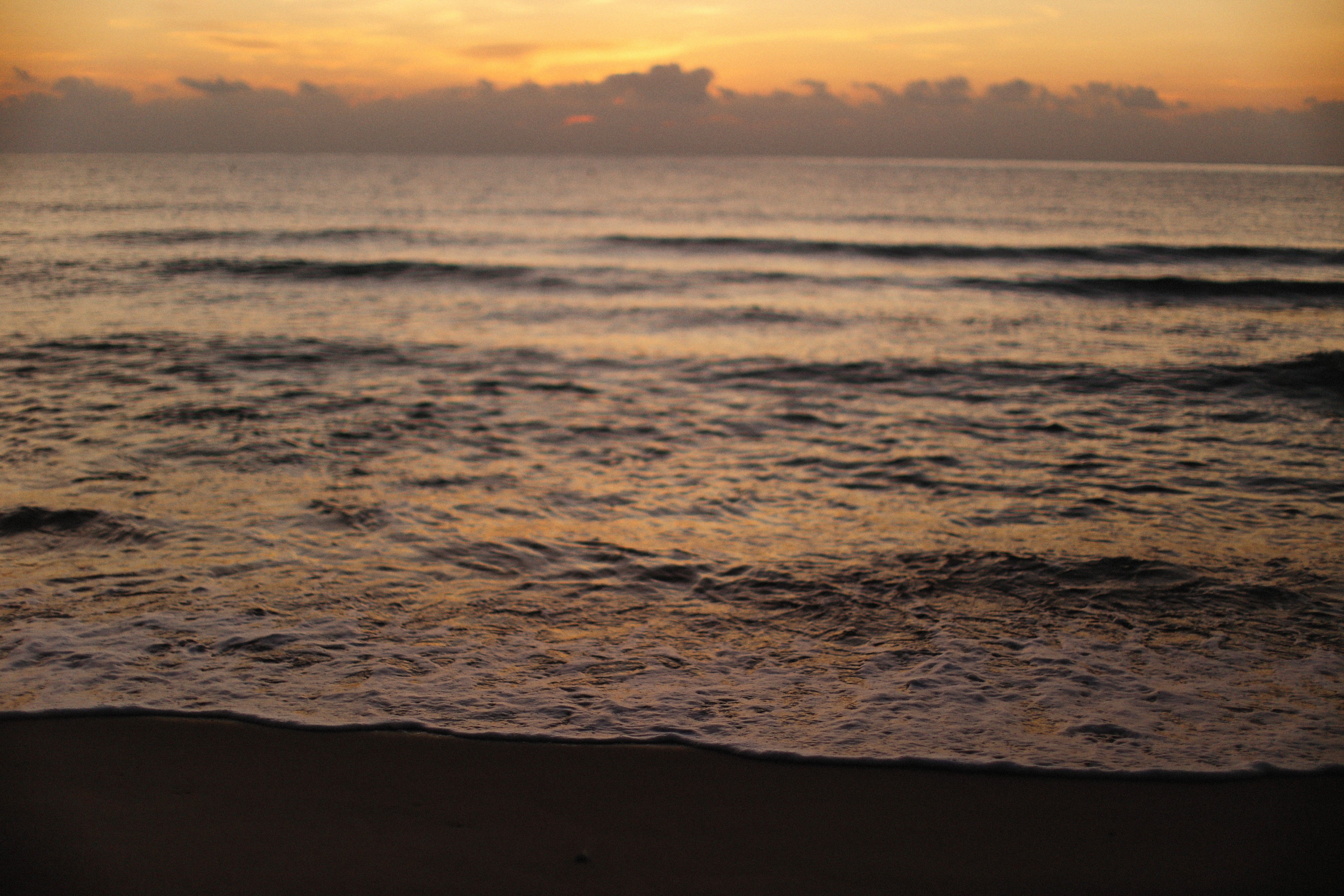 Calm Water in the Sea During Sunset · Free Stock Photo
