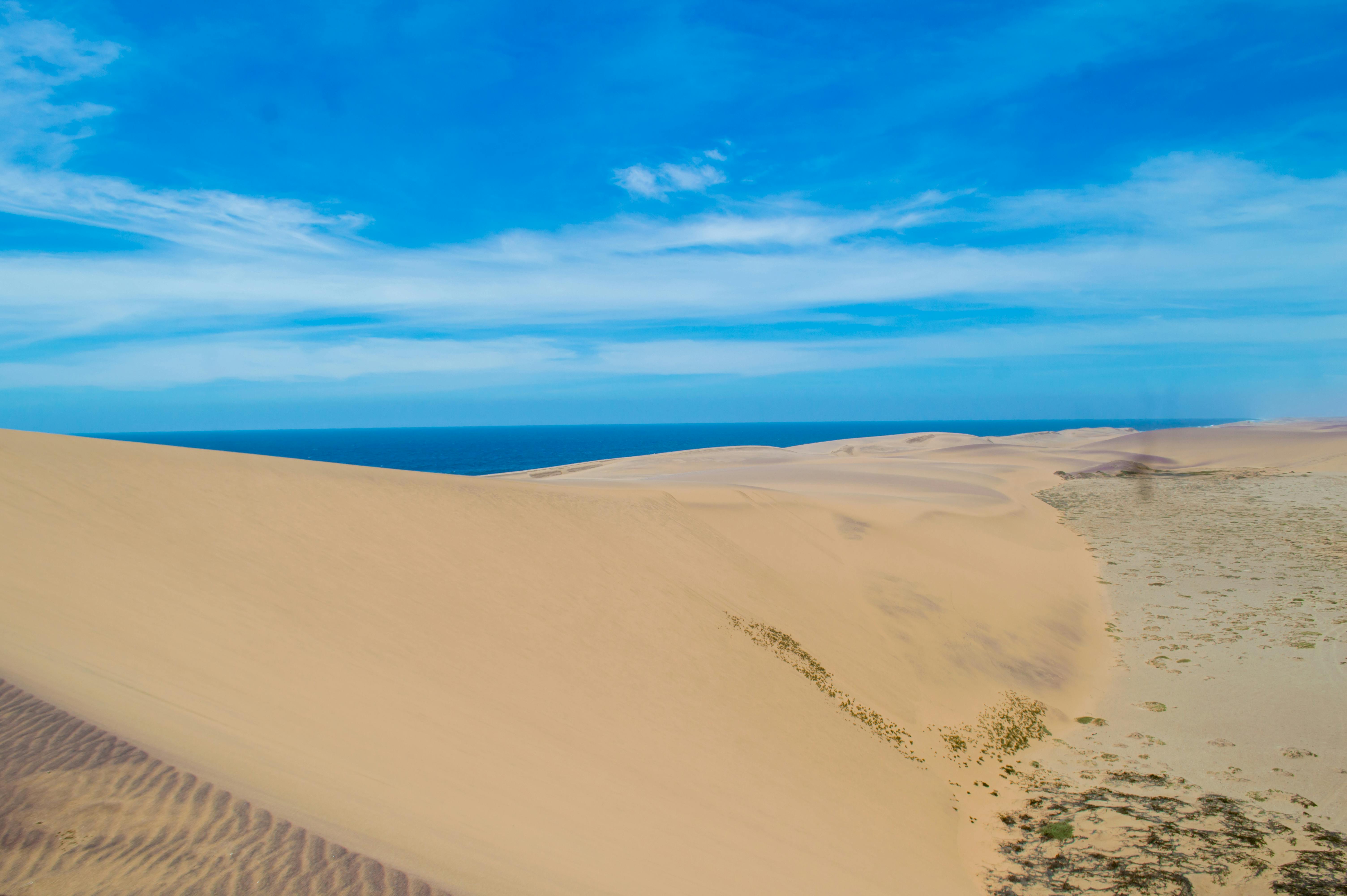 Hill of Sand by the Sea · Free Stock Photo