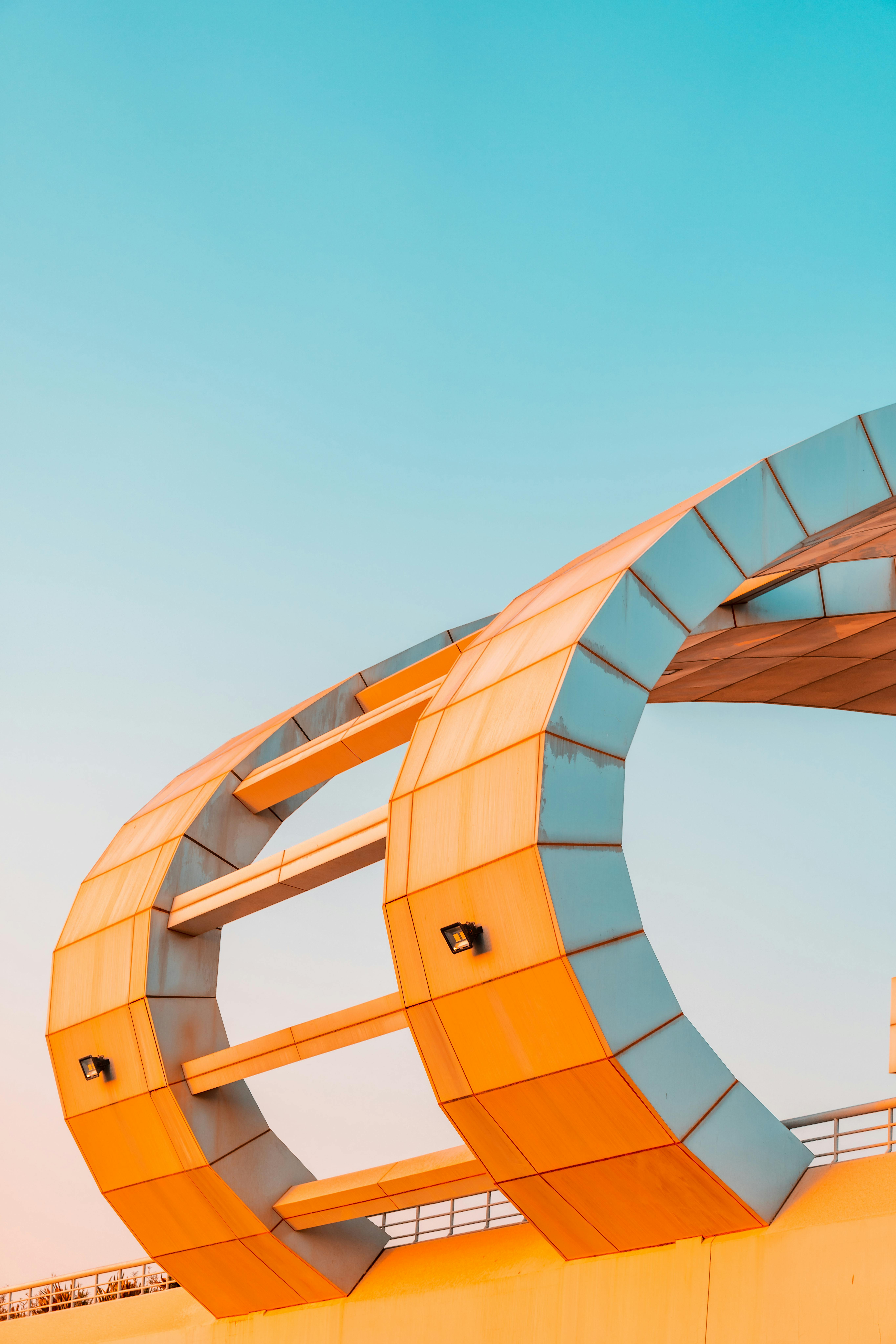 Orange Piece of Architecture Over Clear Sky · Free Stock Photo