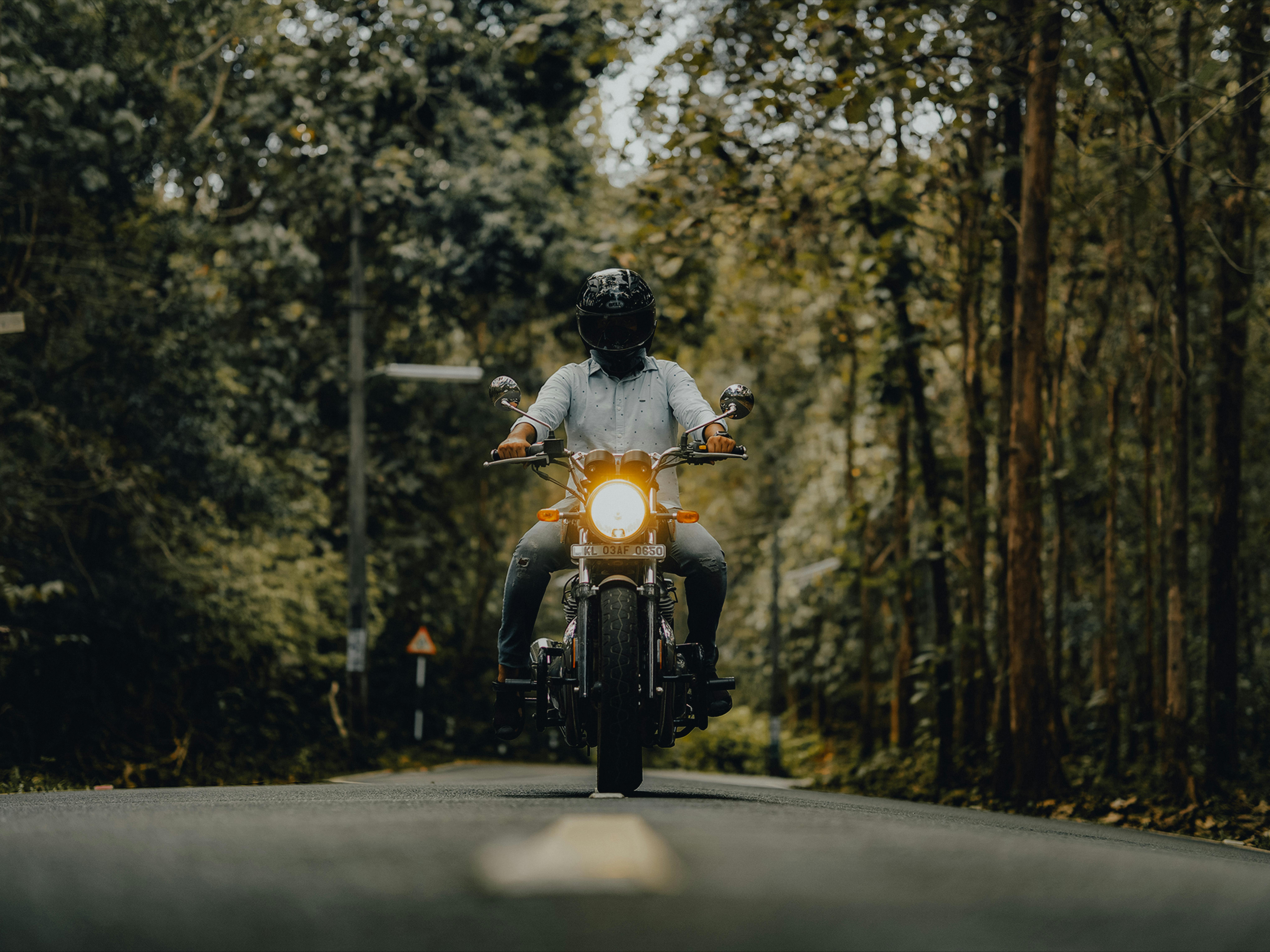 Man Riding a Motorcycle · Free Stock Photo