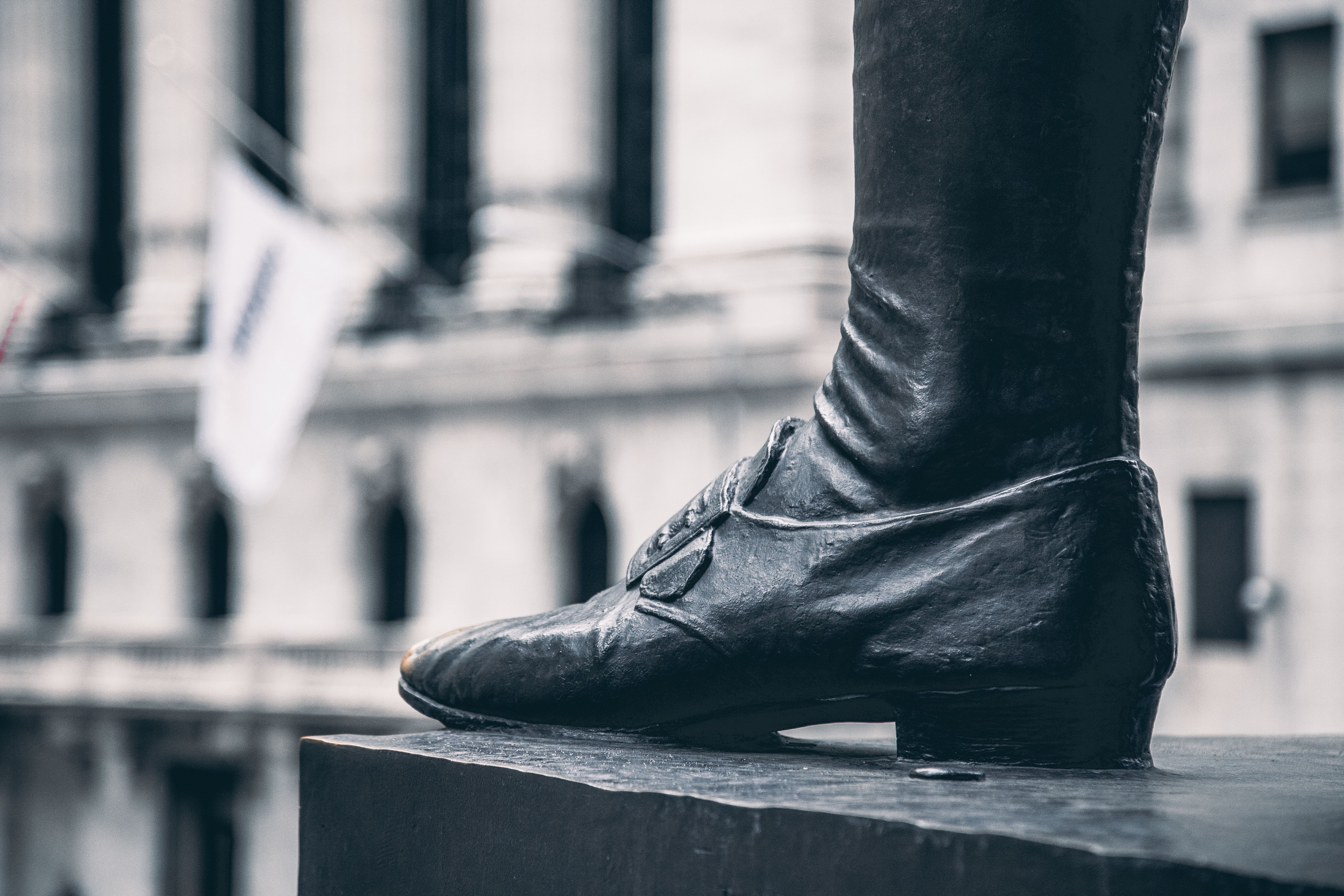 A Close-Up Shot of a Statue's Shoe · Free Stock Photo