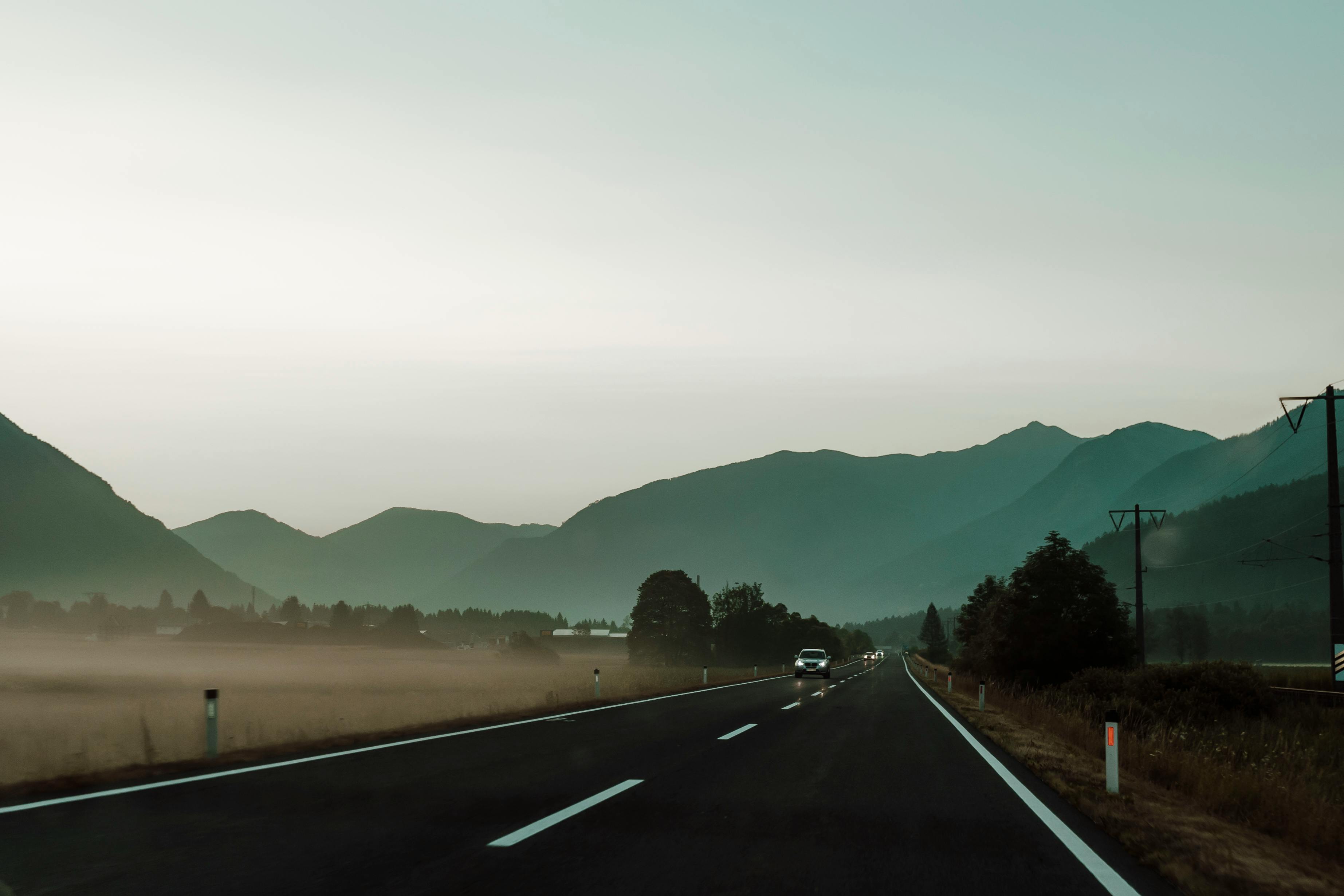 Asphalt Road Across the Field · Free Stock Photo