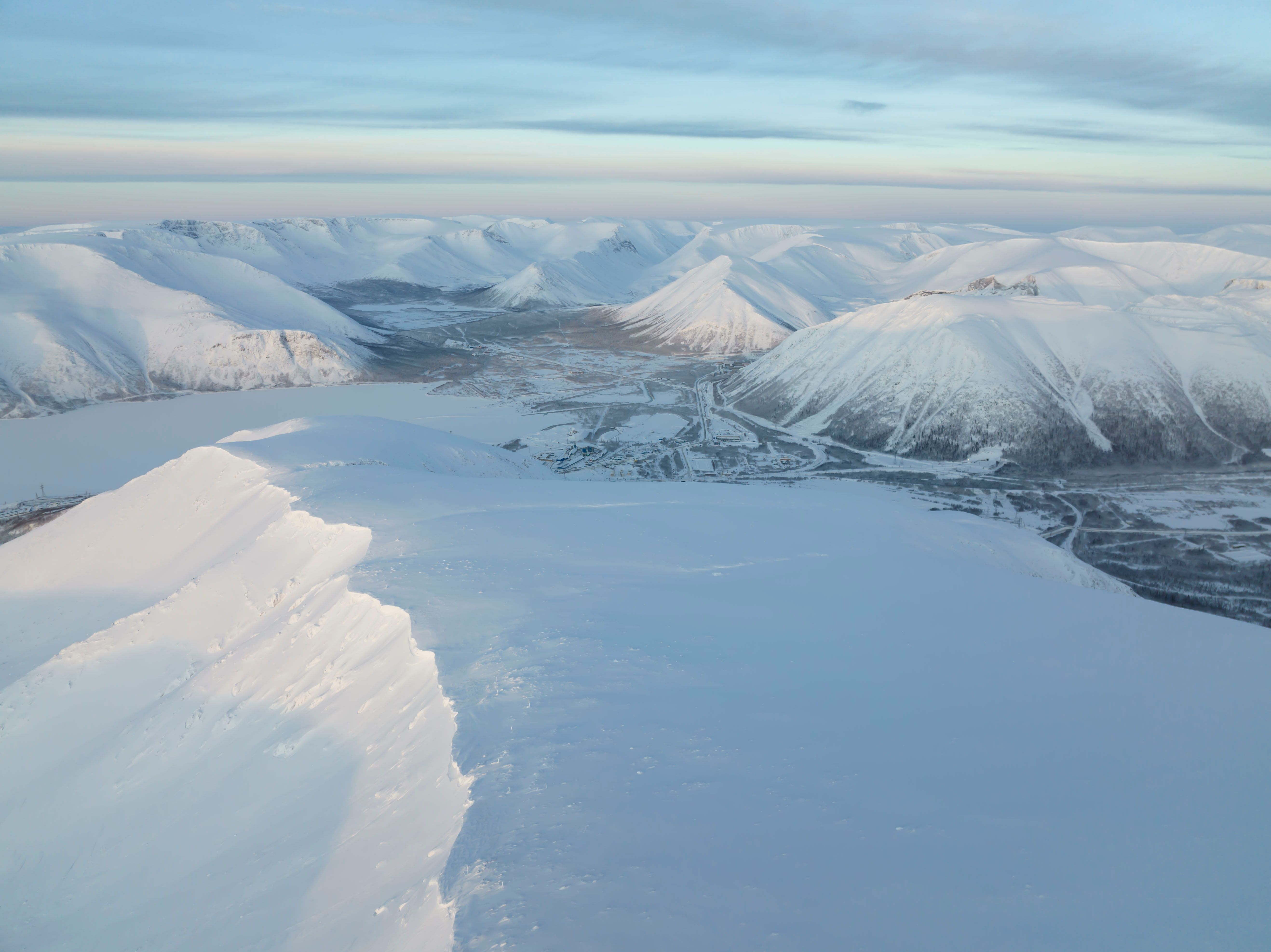 Aerial Photography of Snow-Covered Mountains · Free Stock Photo