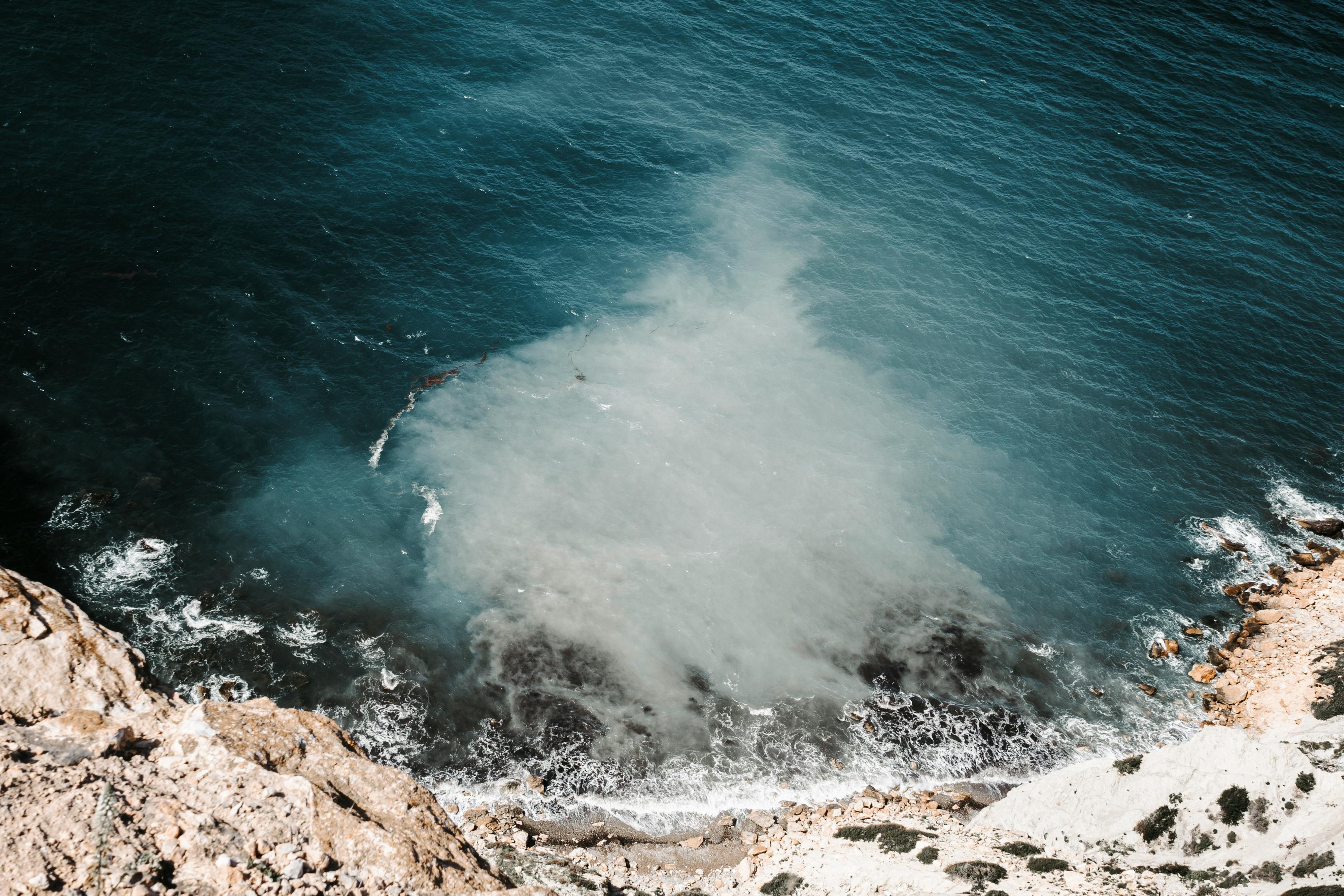 Waves Crashing the Coastal Cliff · Free Stock Photo