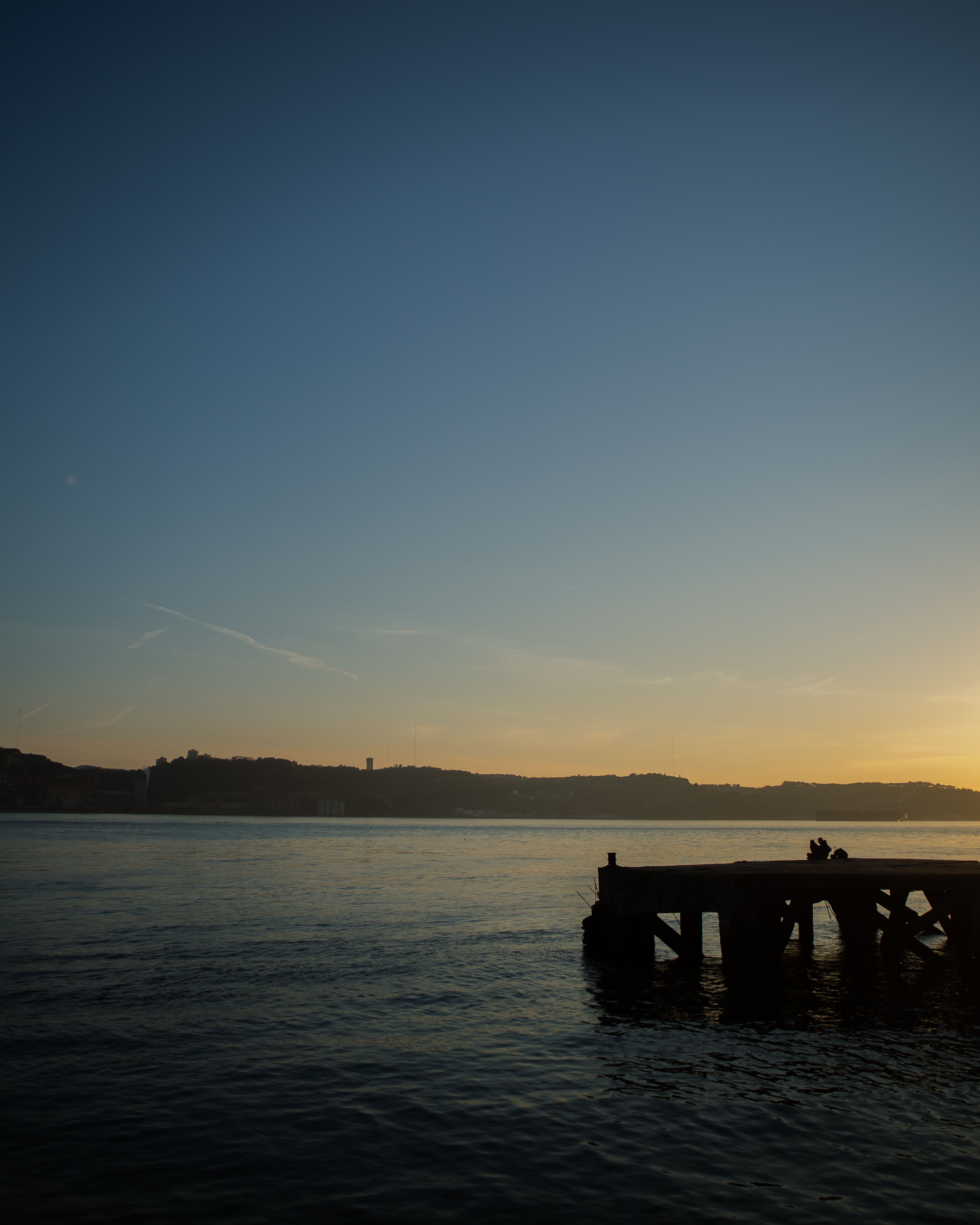 Pier on Lakeshore at Sunset · Free Stock Photo