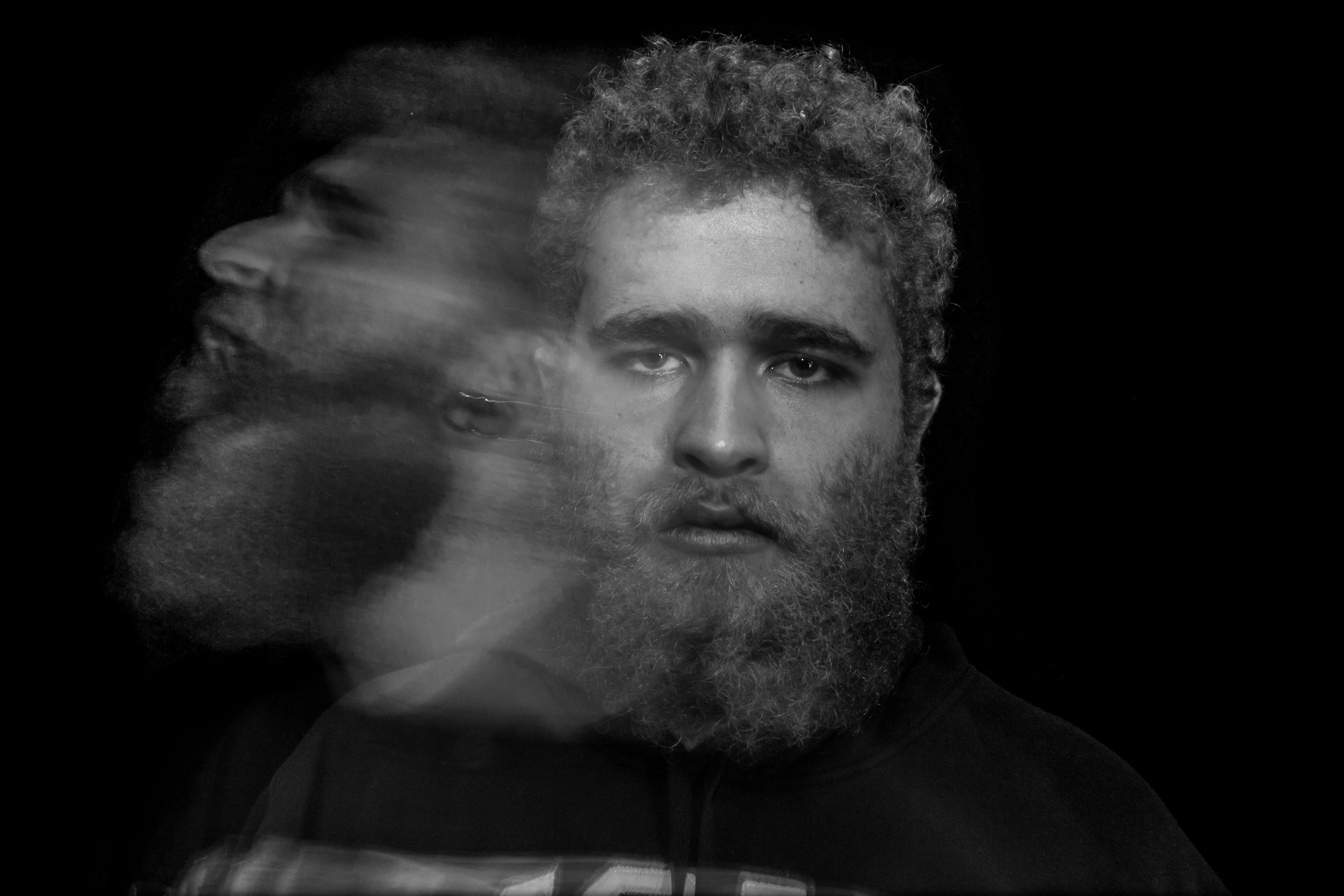 Man with an Overlapping Image of his Face Screaming · Free Stock Photo