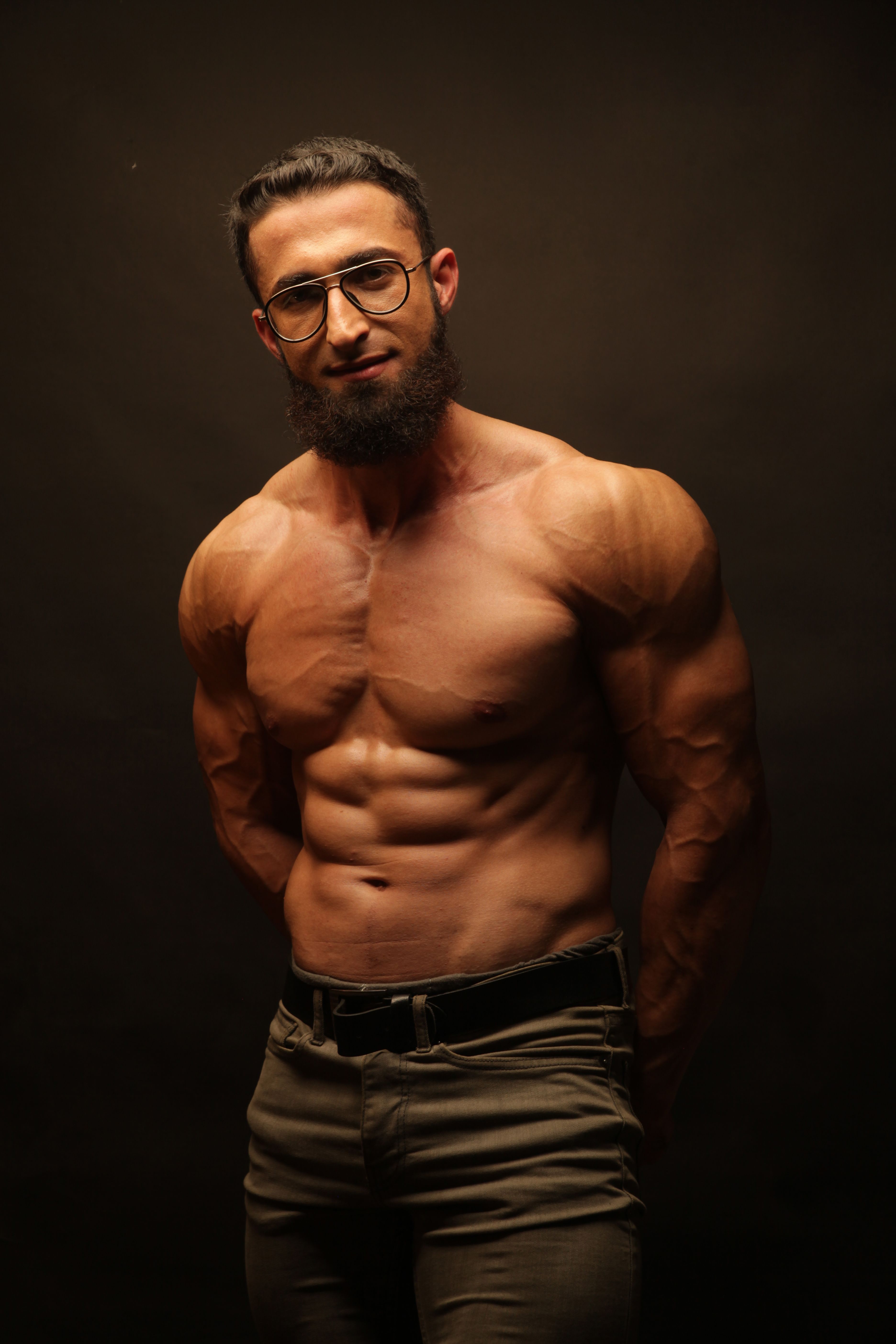 Muscular Man Wearing Eyeglasses · Free Stock Photo