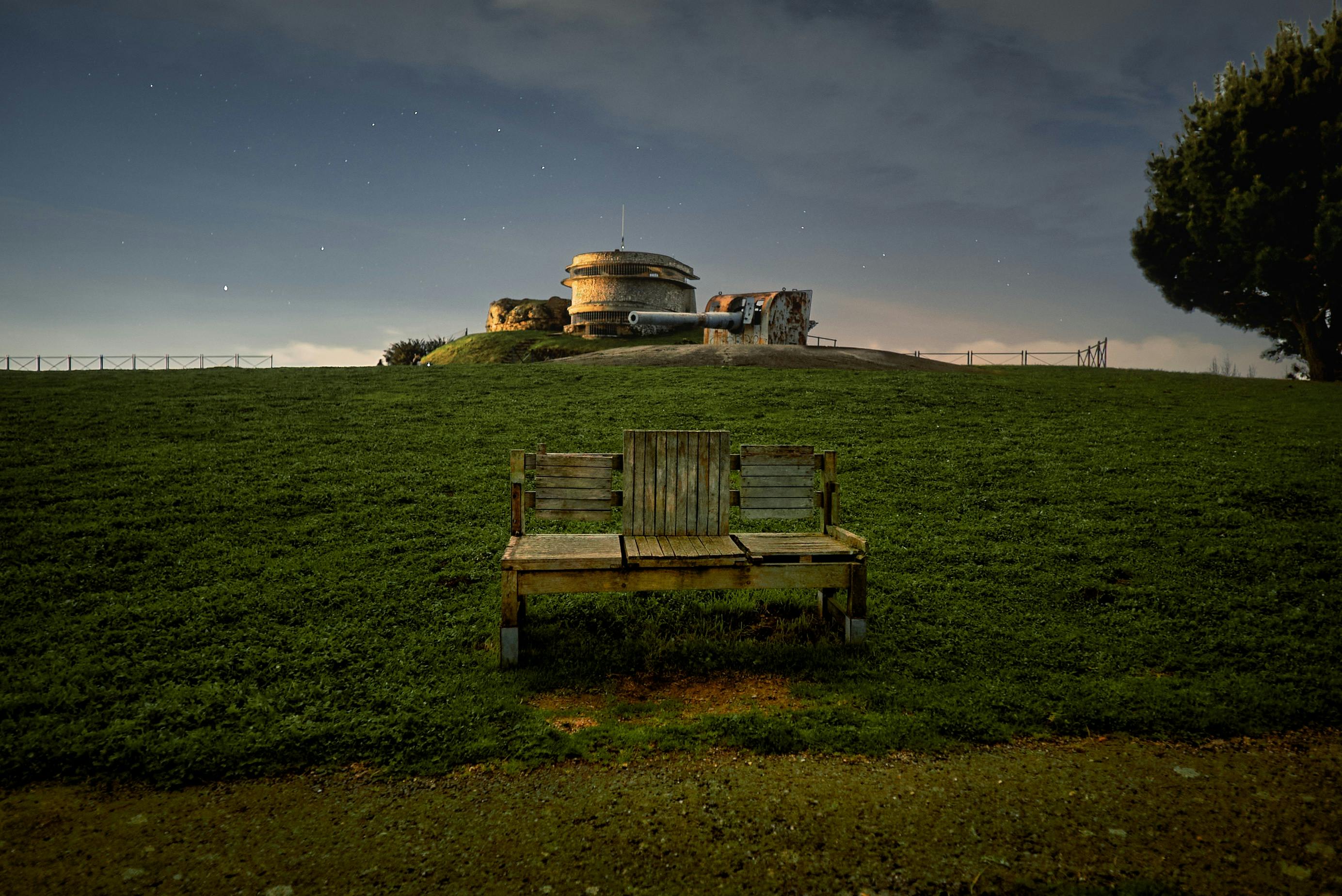 Wooden Bench on Grass Field · Free Stock Photo