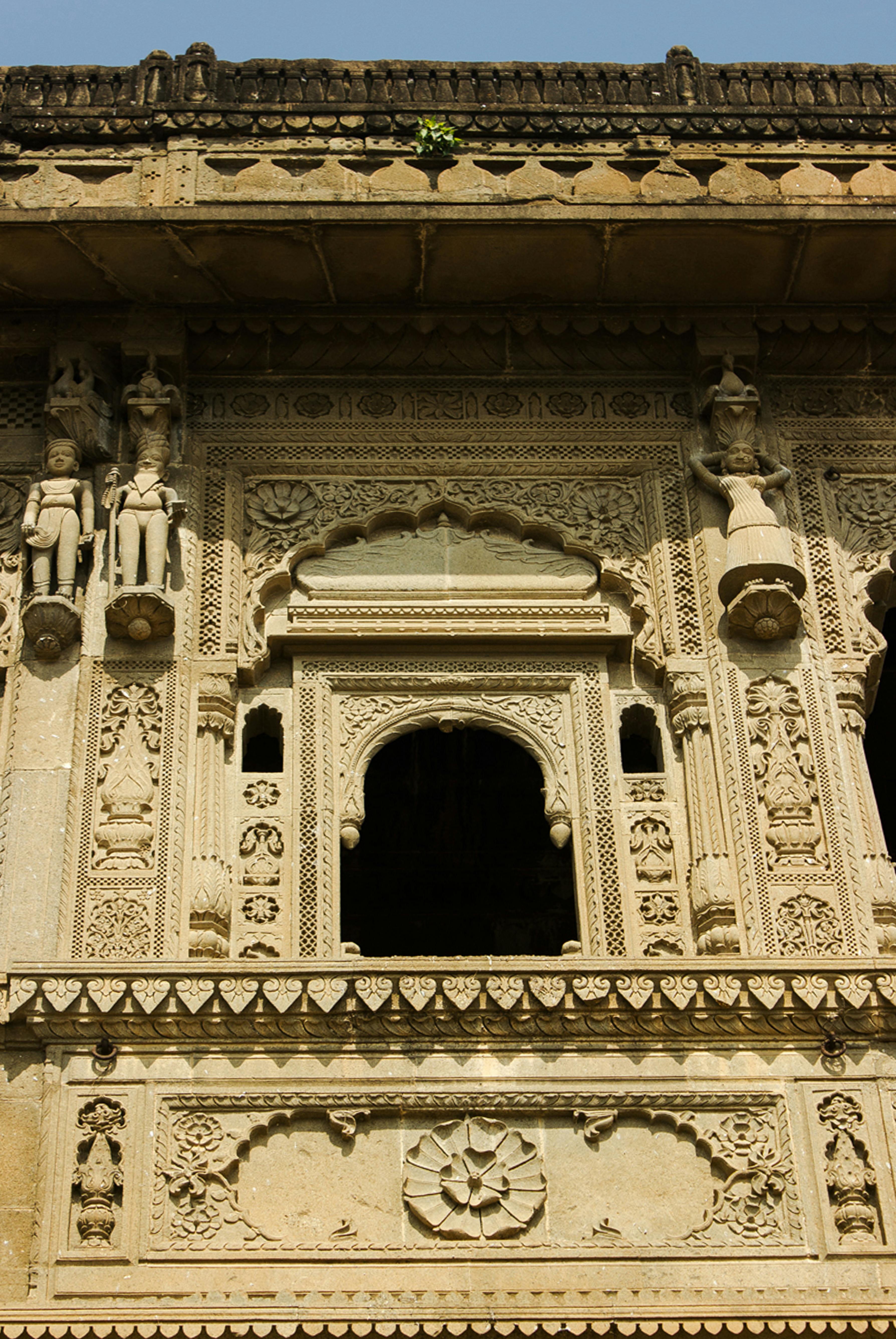A Building with Ornate Carvings · Free Stock Photo