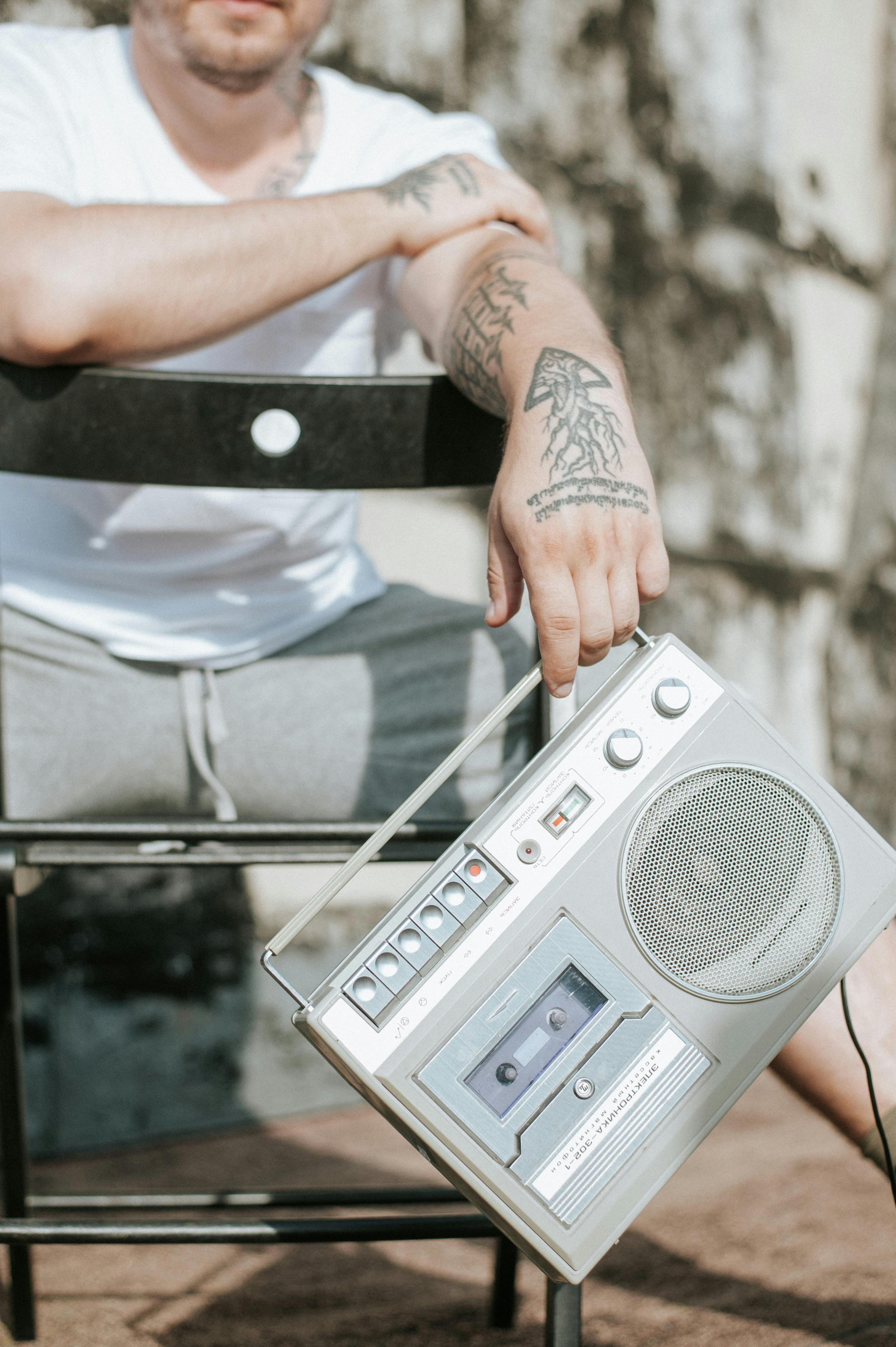 Person Holding a Radio · Free Stock Photo