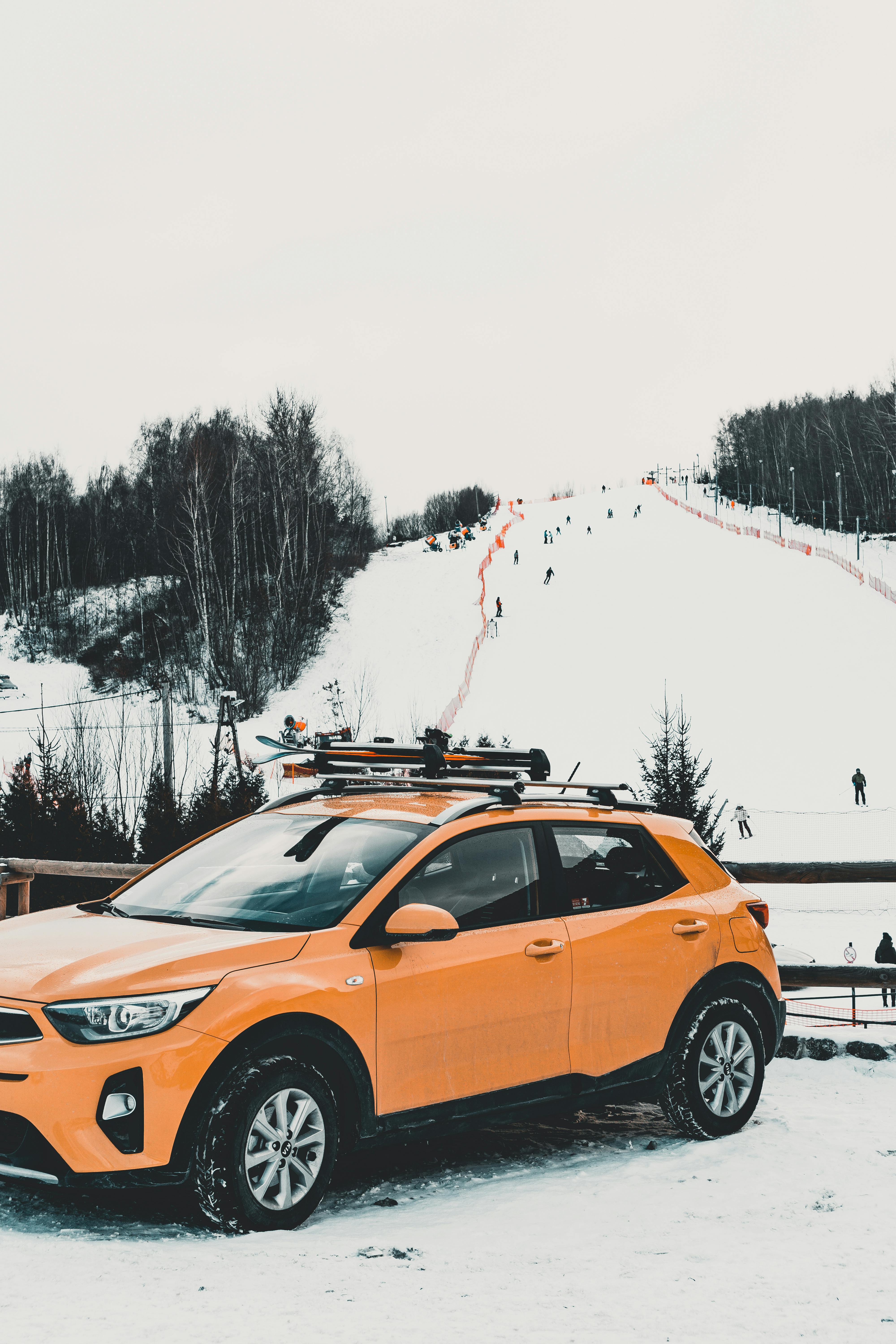 A Car Parked in the Ski Resort Parking Area · Free Stock Photo