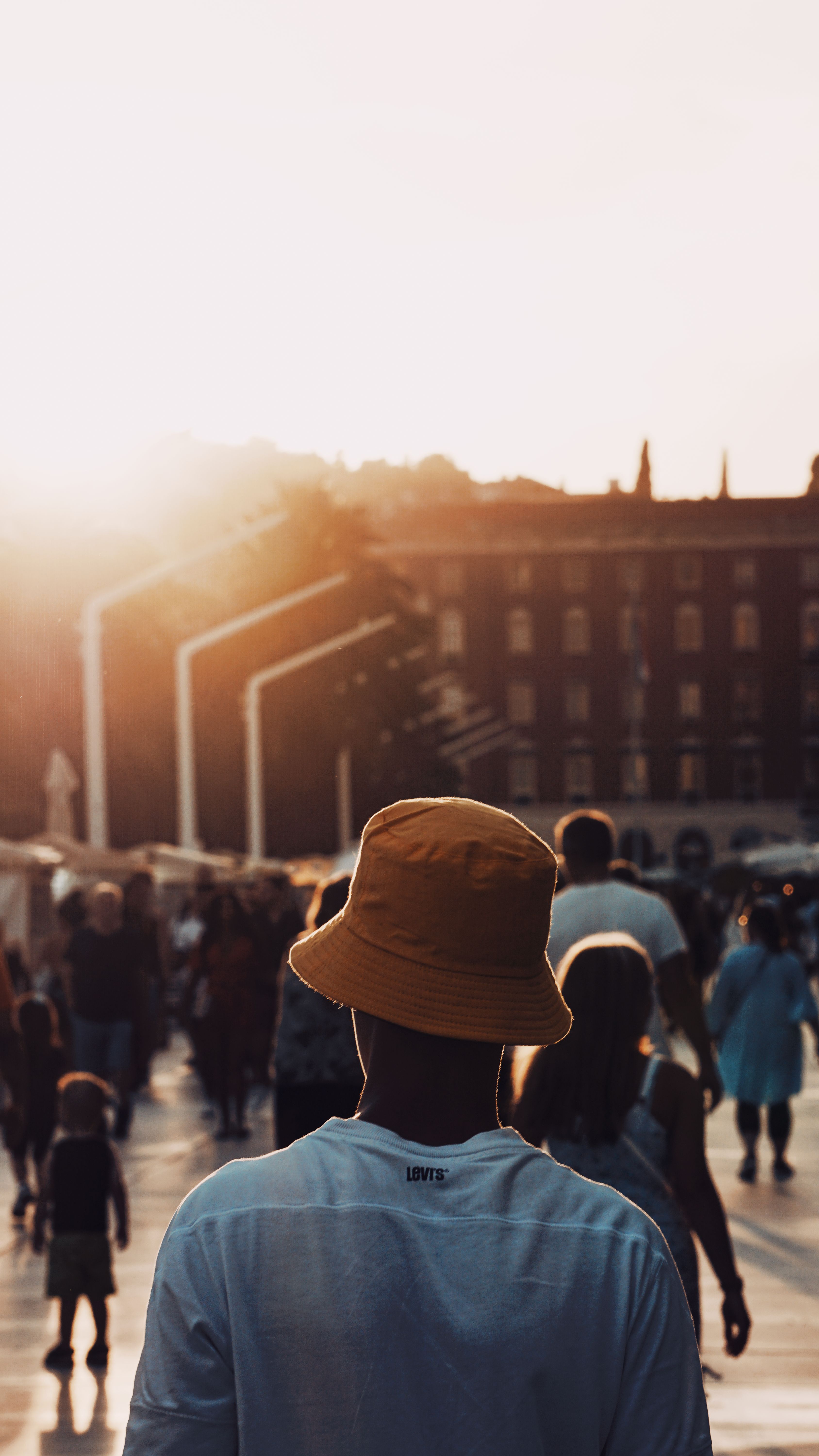 Back View of a Couple Wearing Fedora Hats · Free Stock Photo
