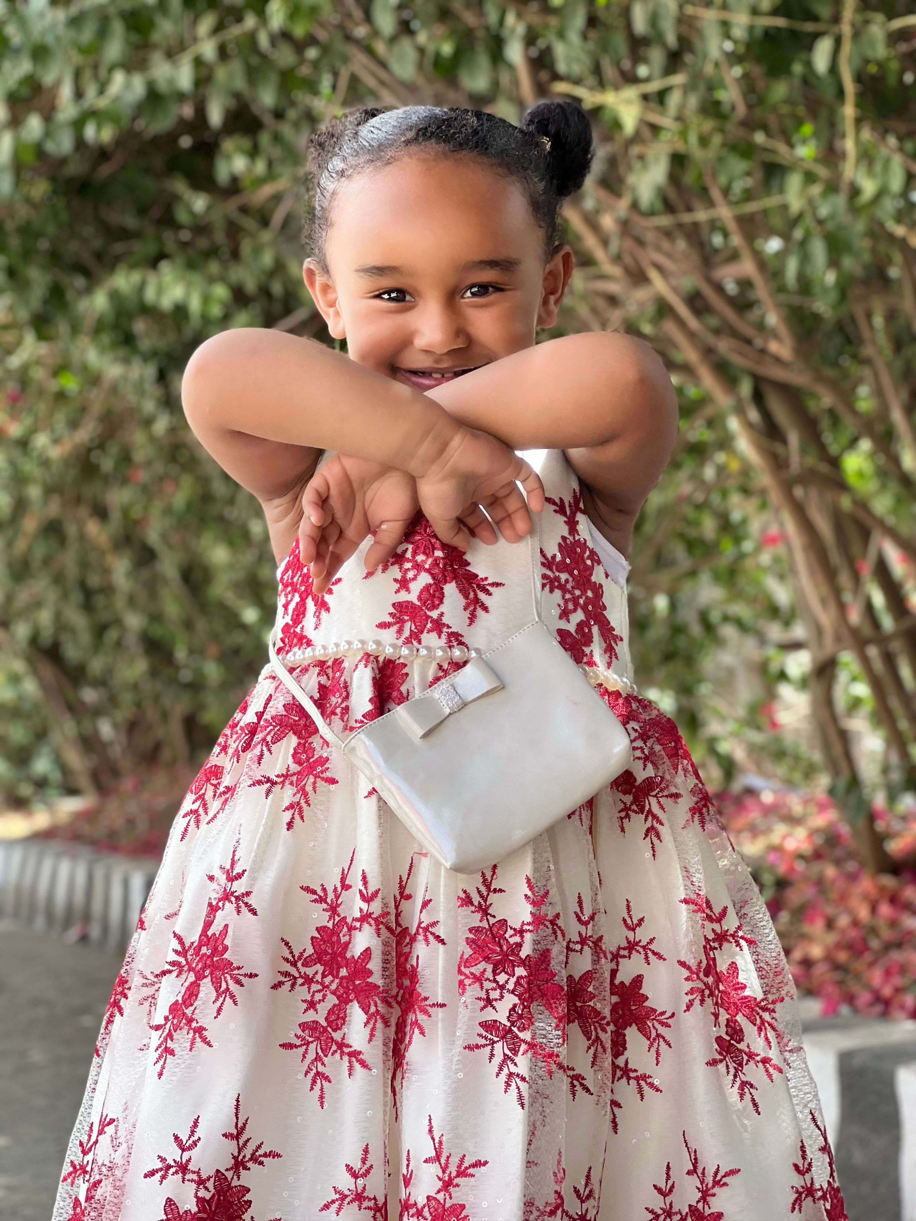 Cute Girl Wearing a Dress · Free Stock Photo