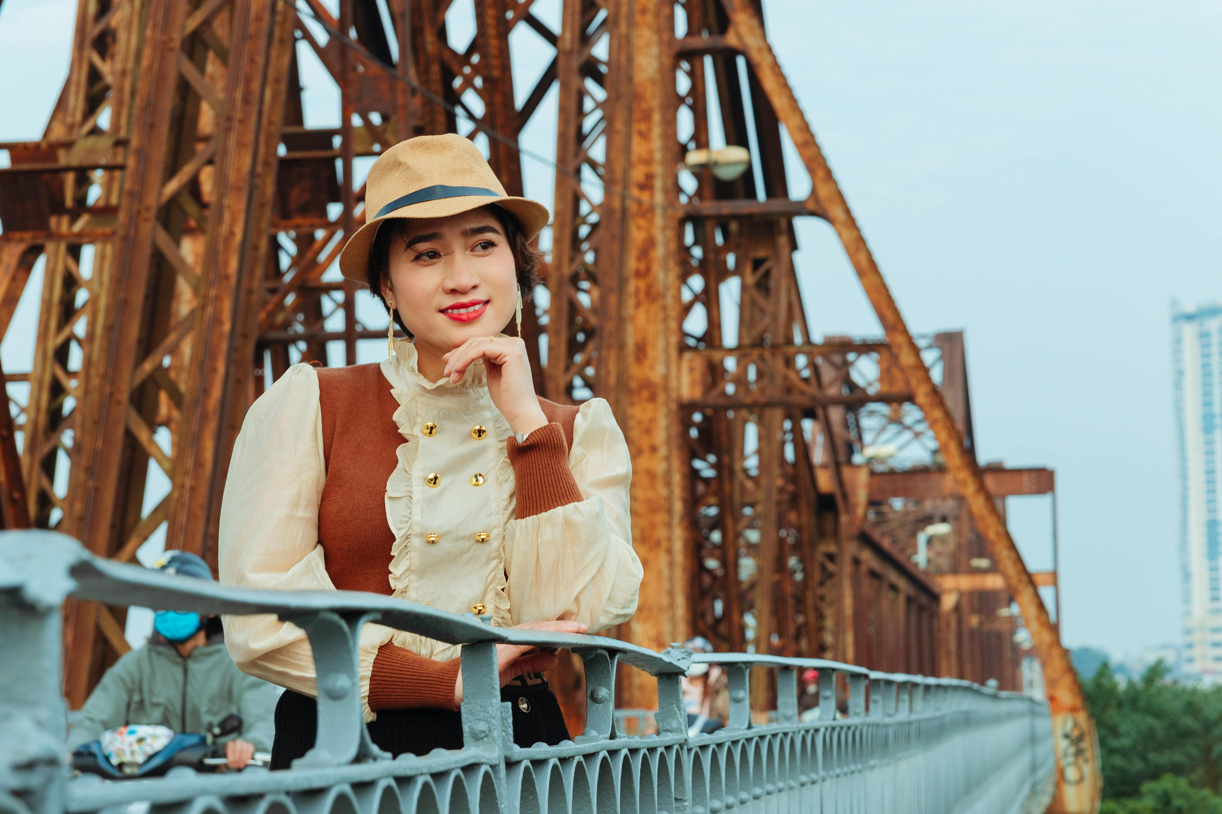 A Woman Pointing her Chin · Free Stock Photo
