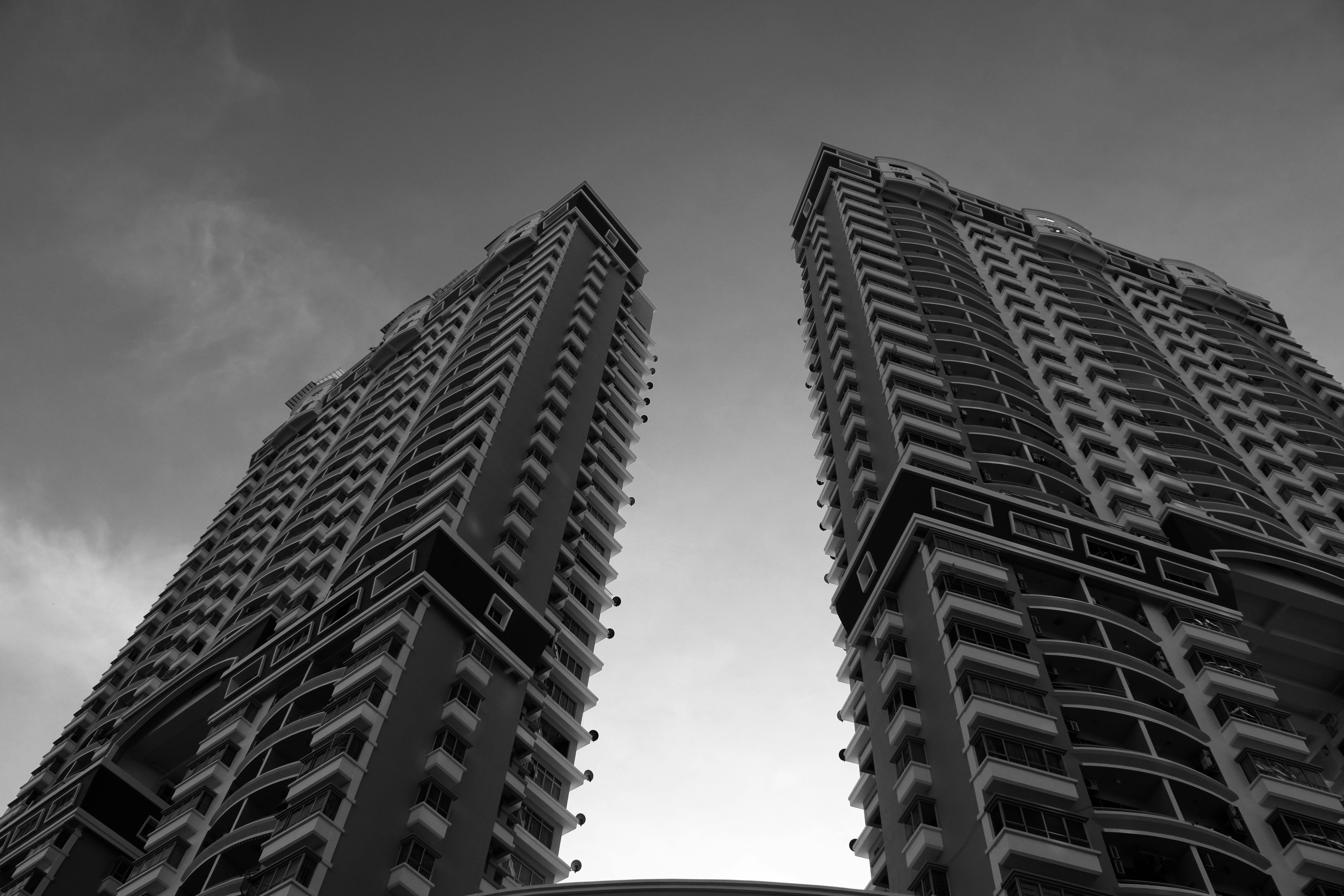 Grayscale Photo of High Rise Buildings · Free Stock Photo