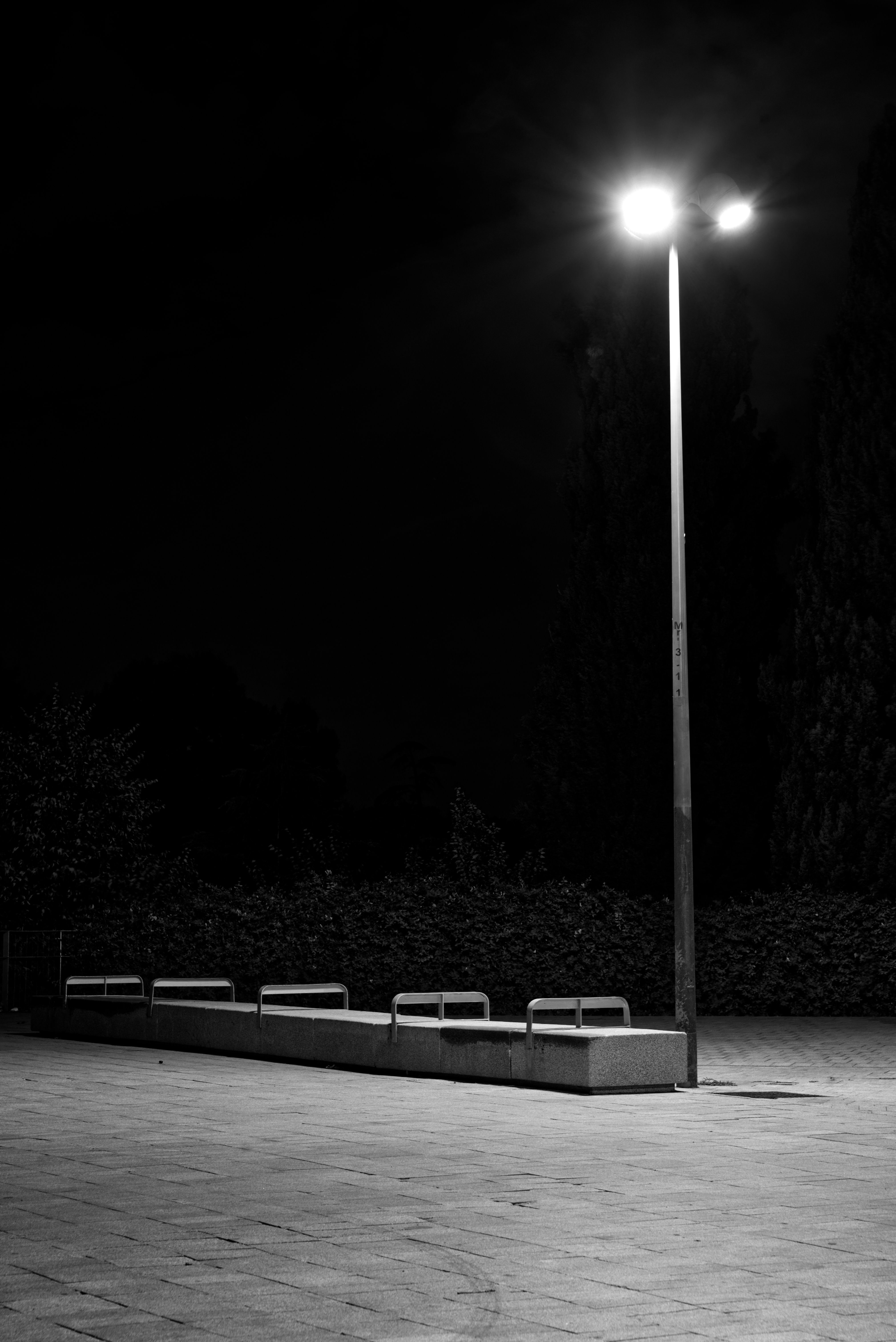 Concrete Bench Lamp Post Grayscale Photo · Free Stock Photo