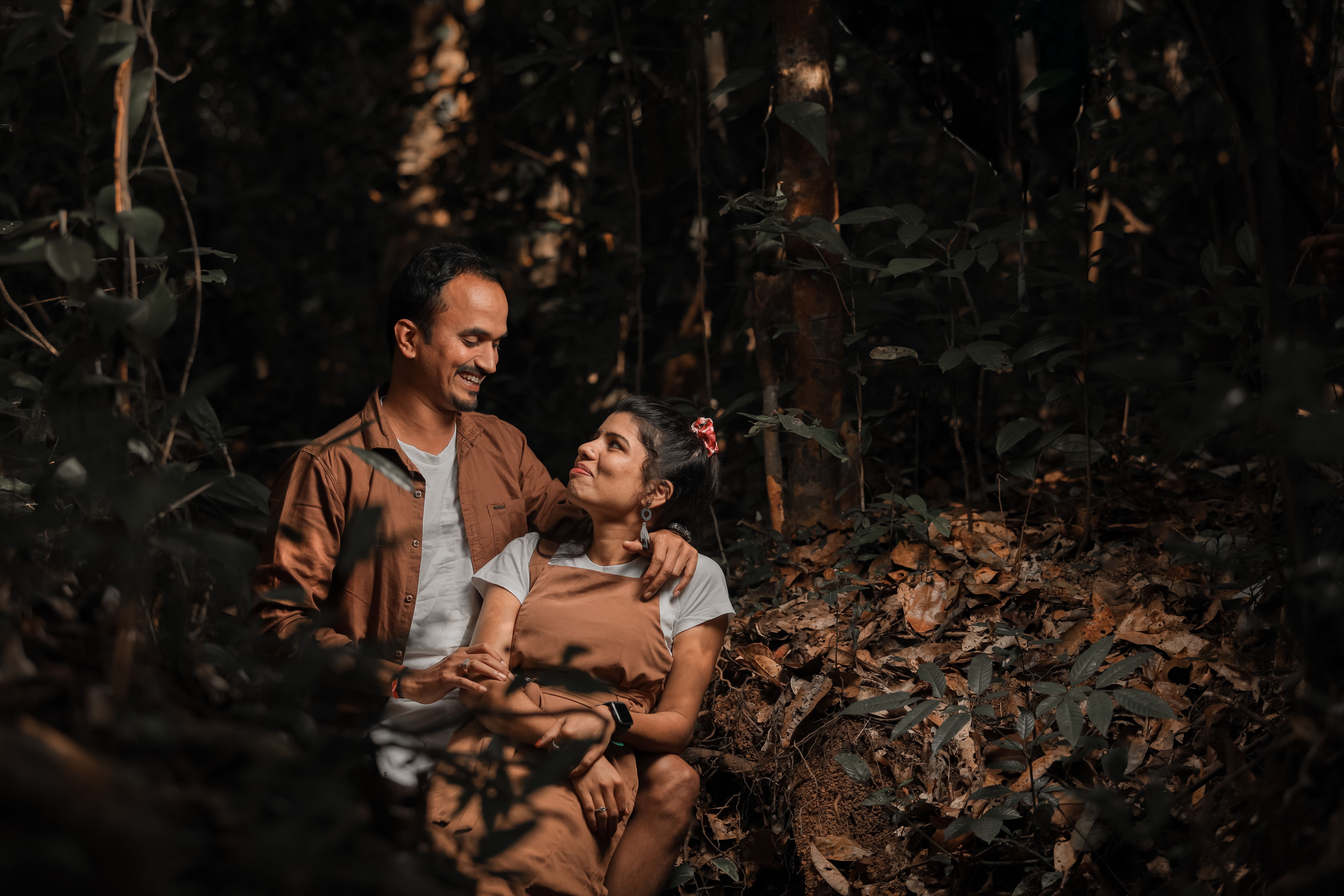 Man and Woman Photographing Building Together · Free Stock Photo