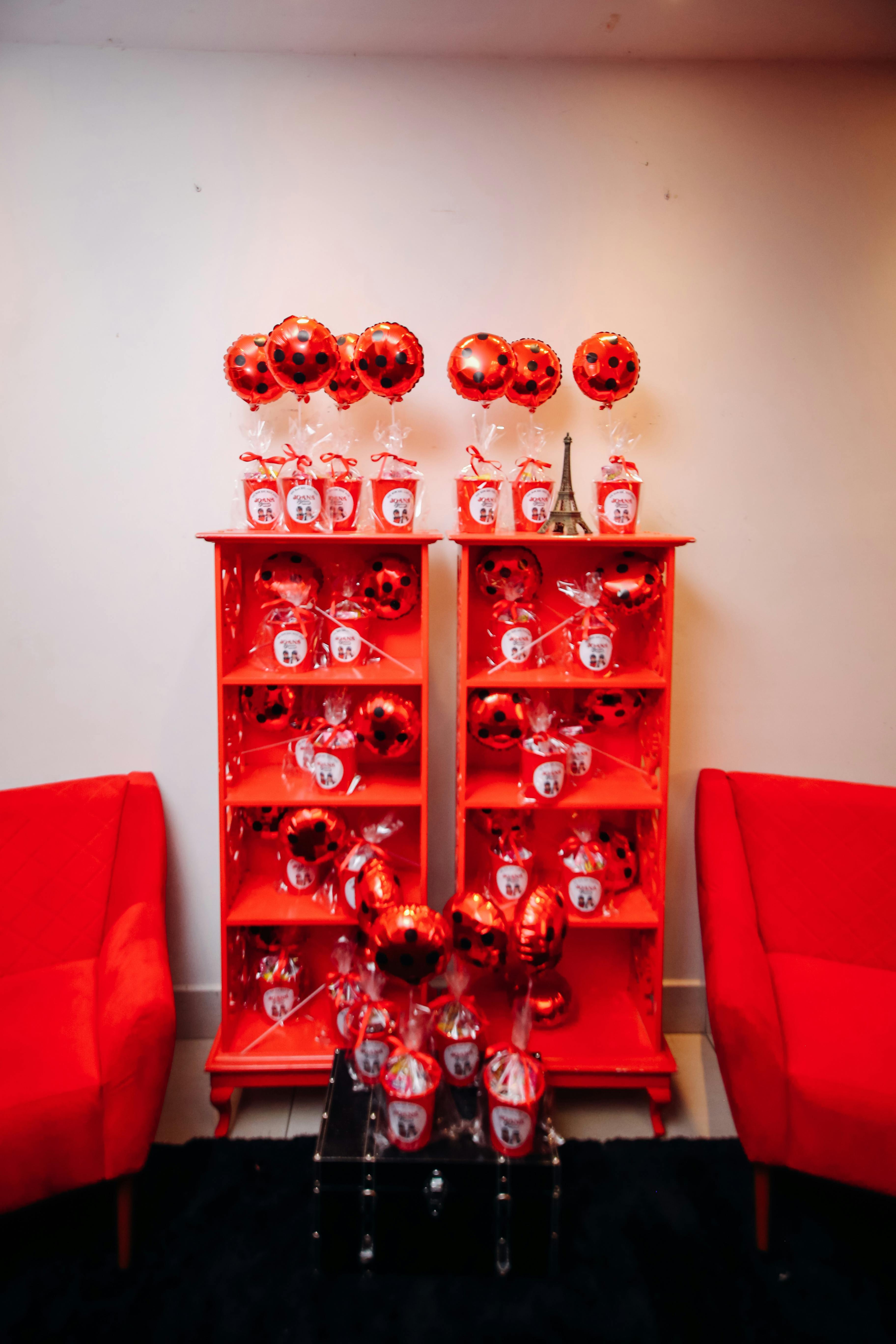Red Ballons and Decorations on Shelves · Free Stock Photo