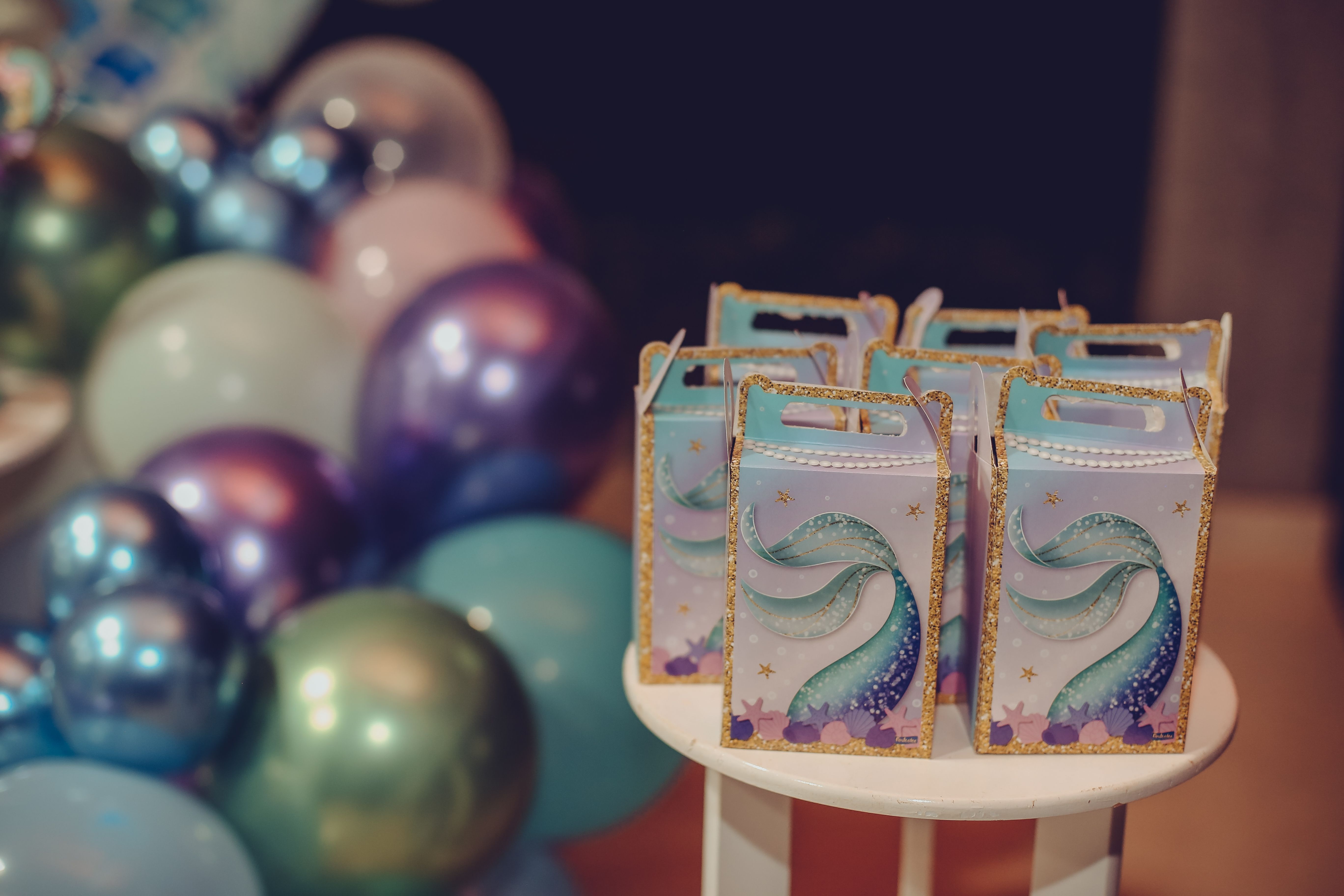 Colourful Bunch of Balloons and Ornate Carton Boxes · Free Stock Photo