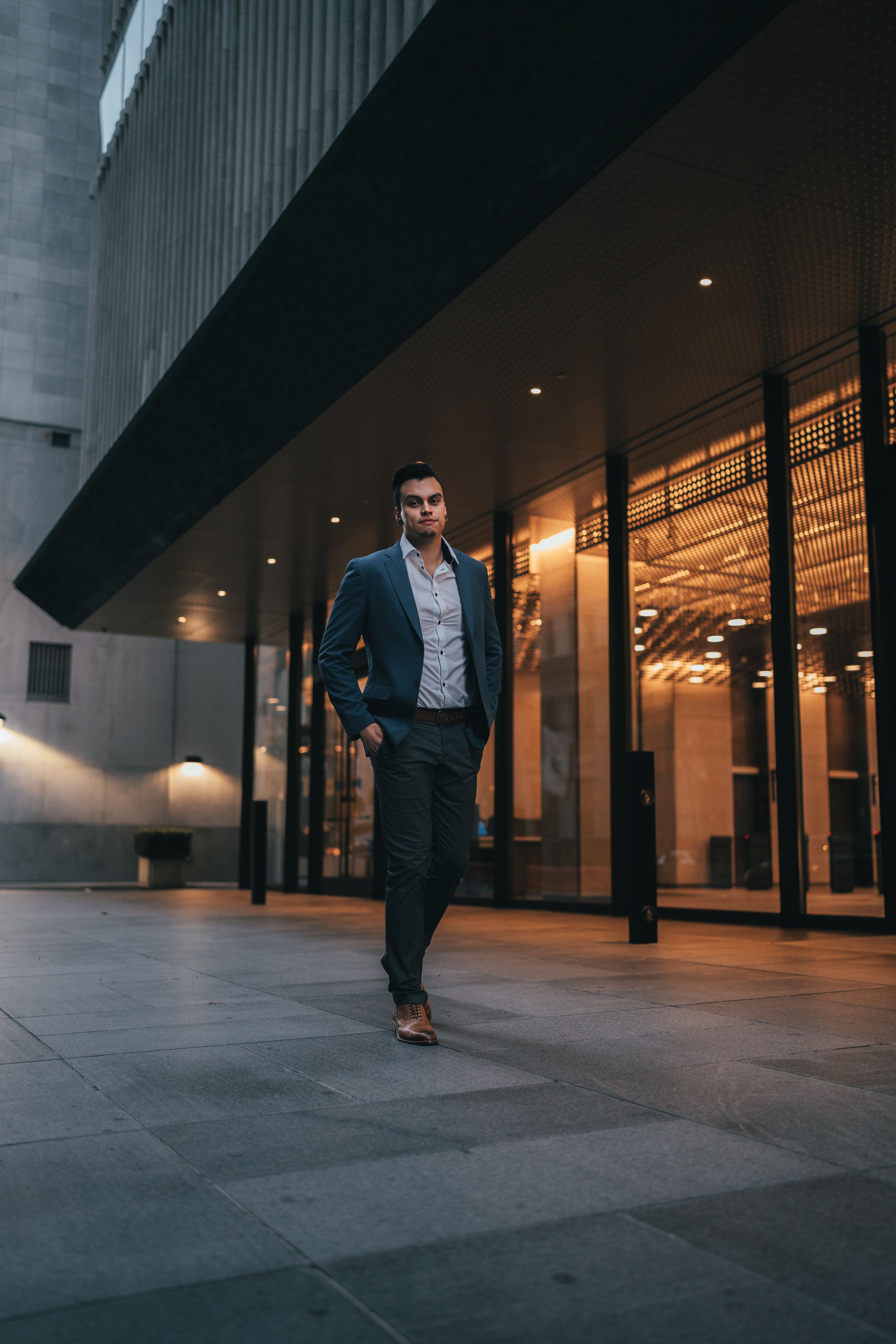 Man Walking on Sidewalk · Free Stock Photo