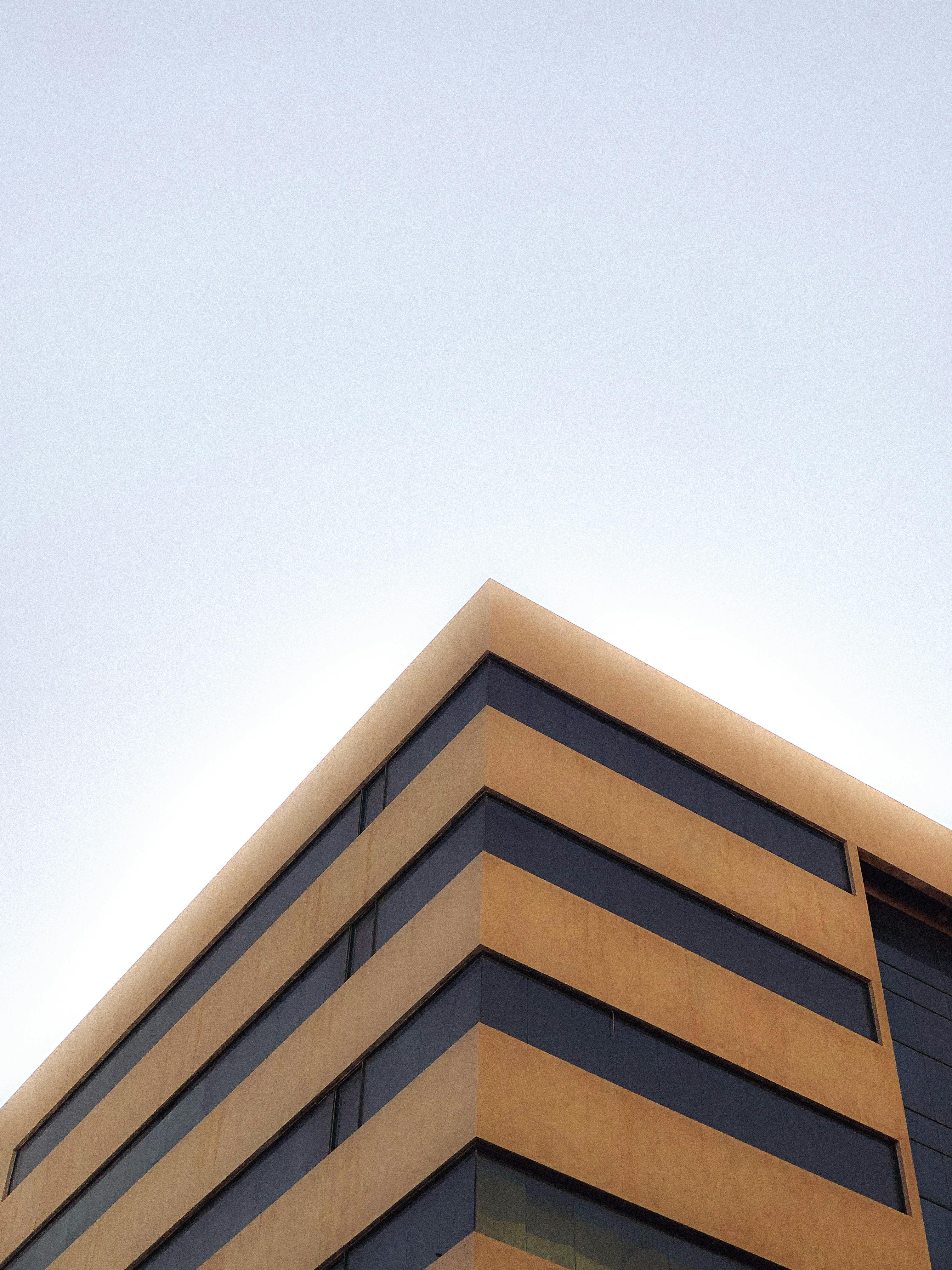 Low-angle Photography of Laminated Glass Building · Free Stock Photo