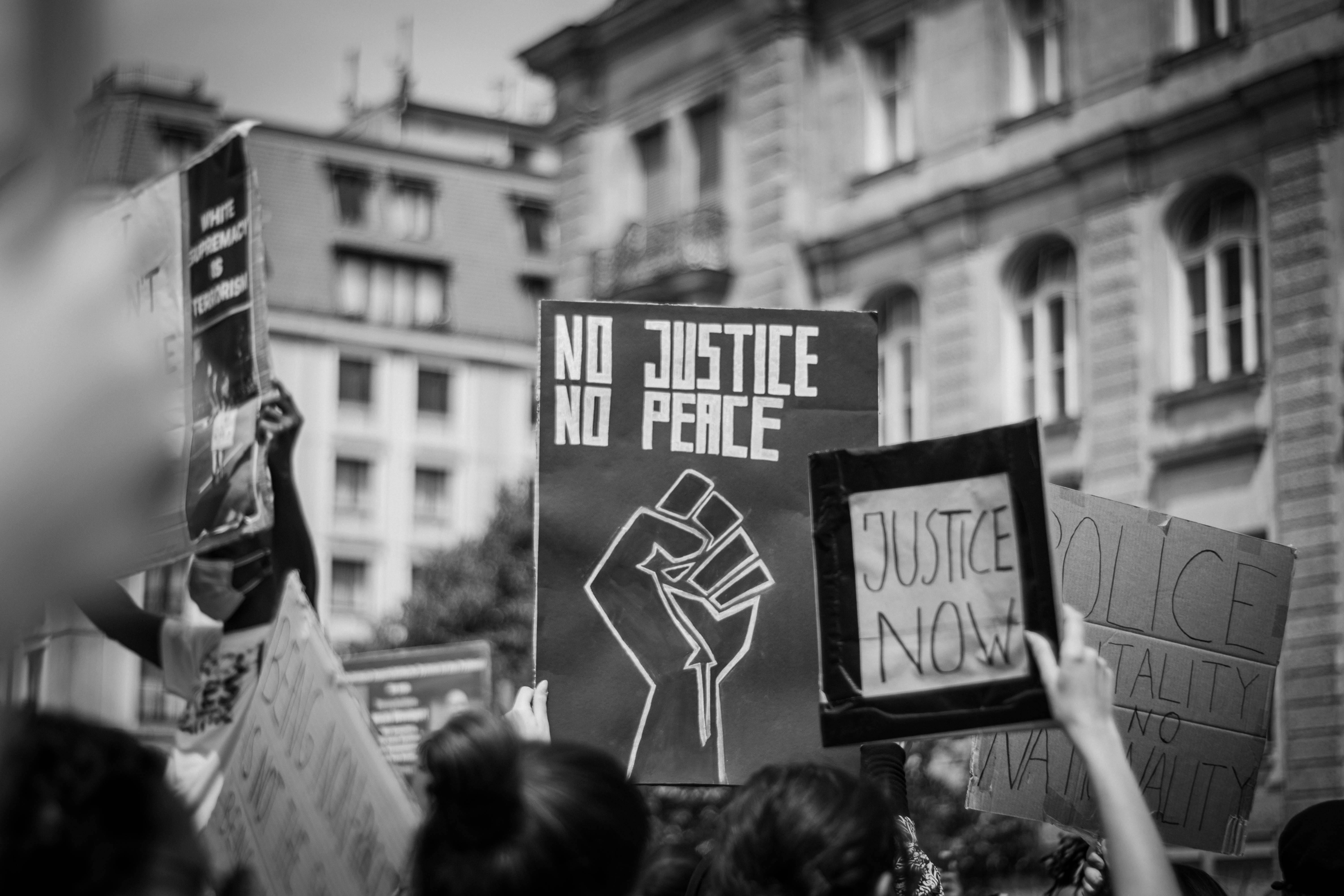 Grayscale Photo of People Protesting · Free Stock Photo