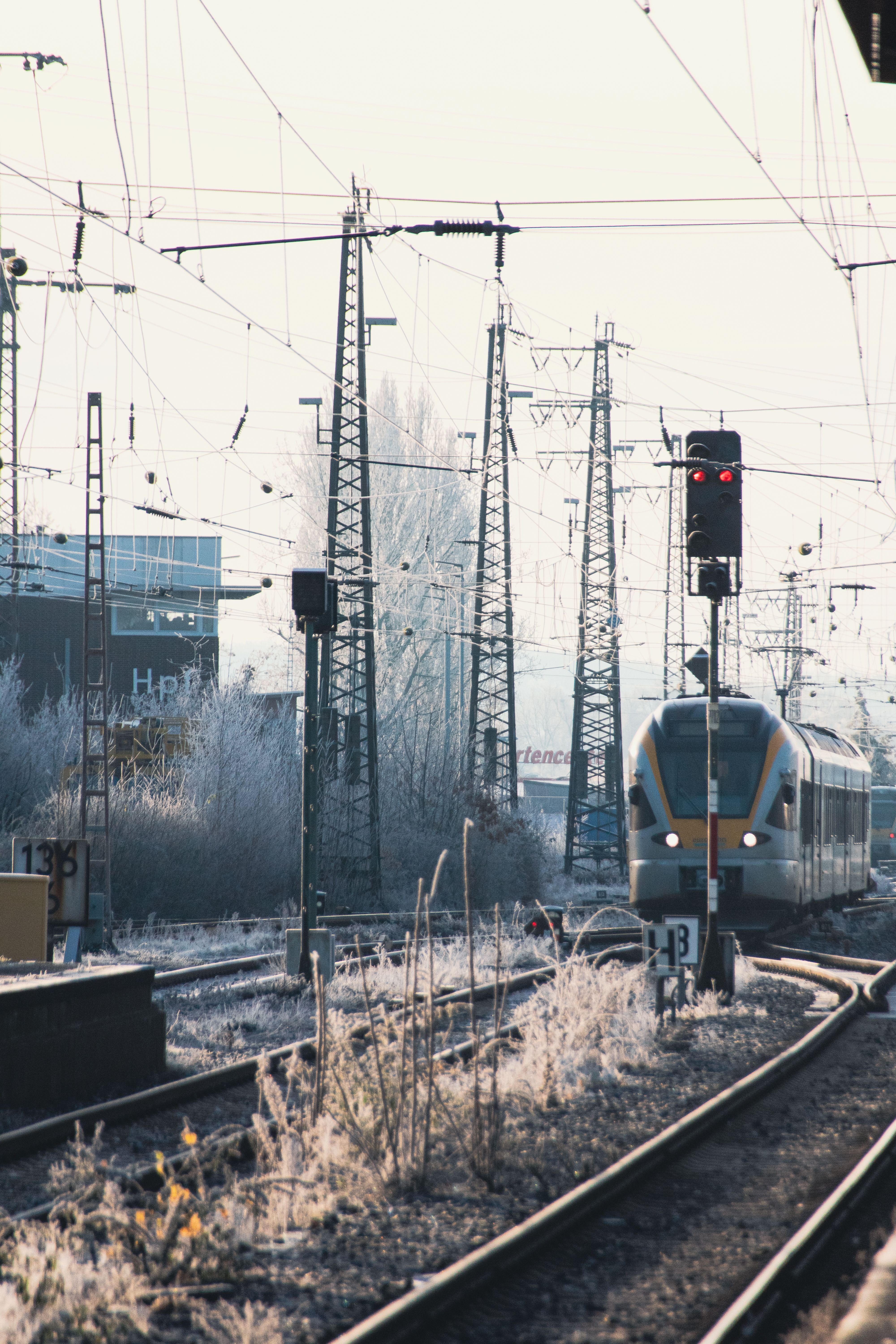 Gray and Yellow Train on Railway · Free Stock Photo