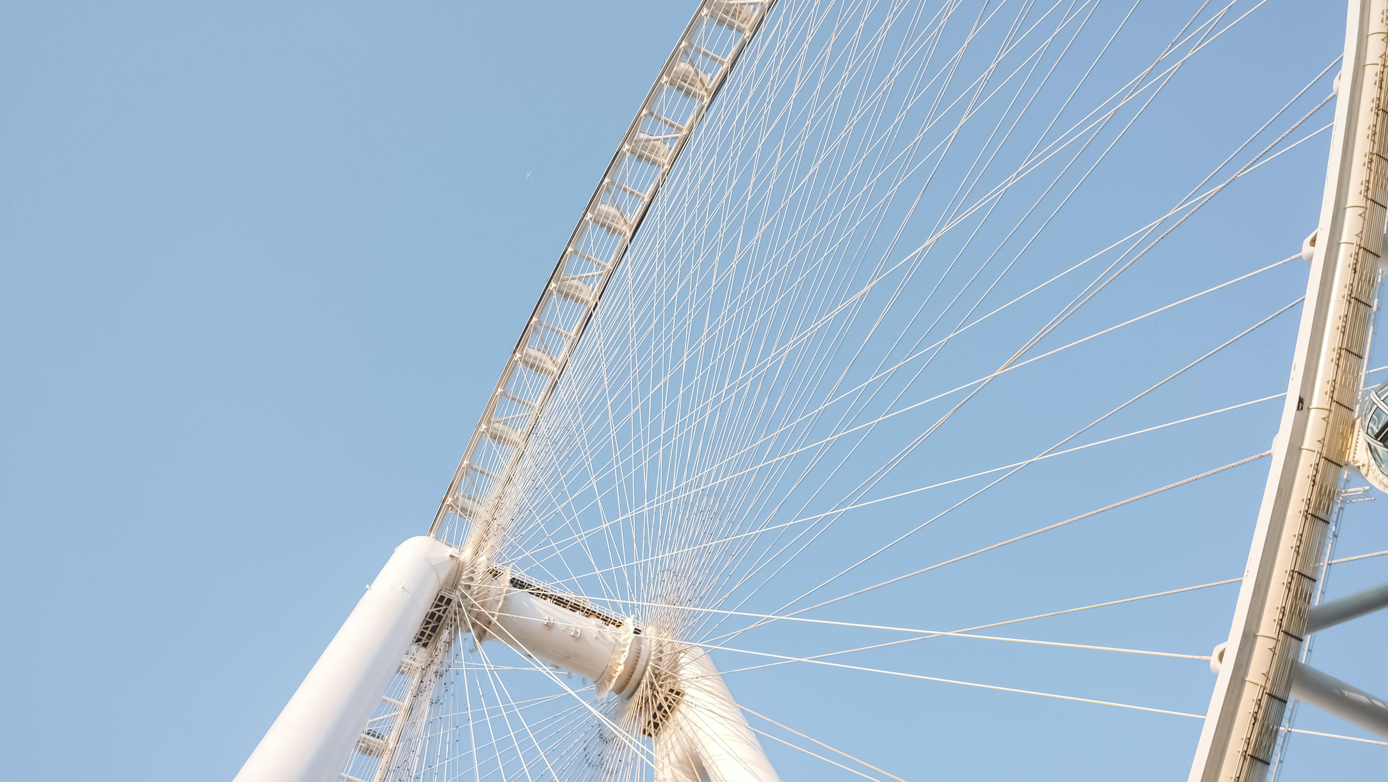 Low-Angle Shot of a White Ferris Wheel · Free Stock Photo