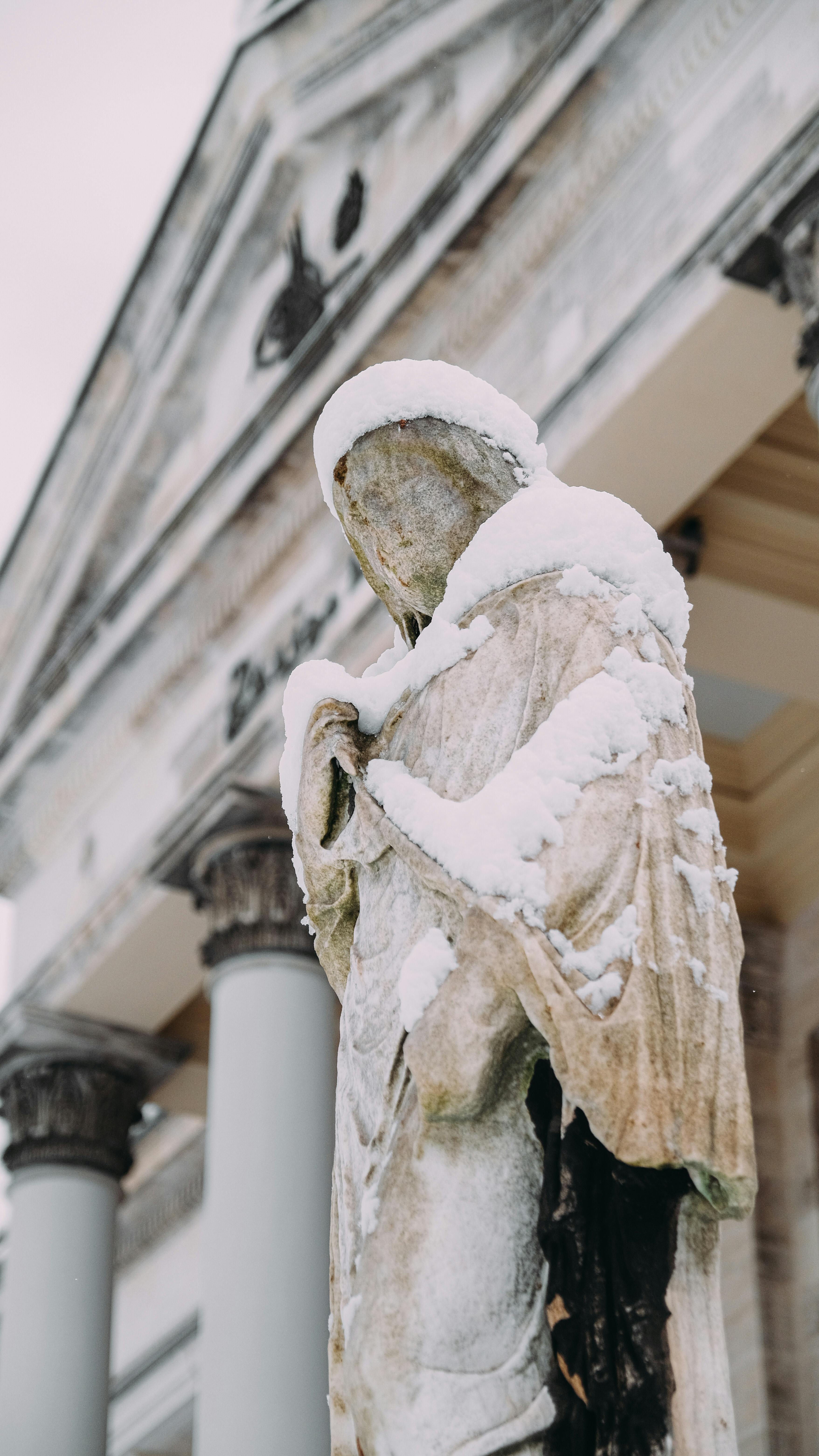 A Snow Covered Statue · Free Stock Photo