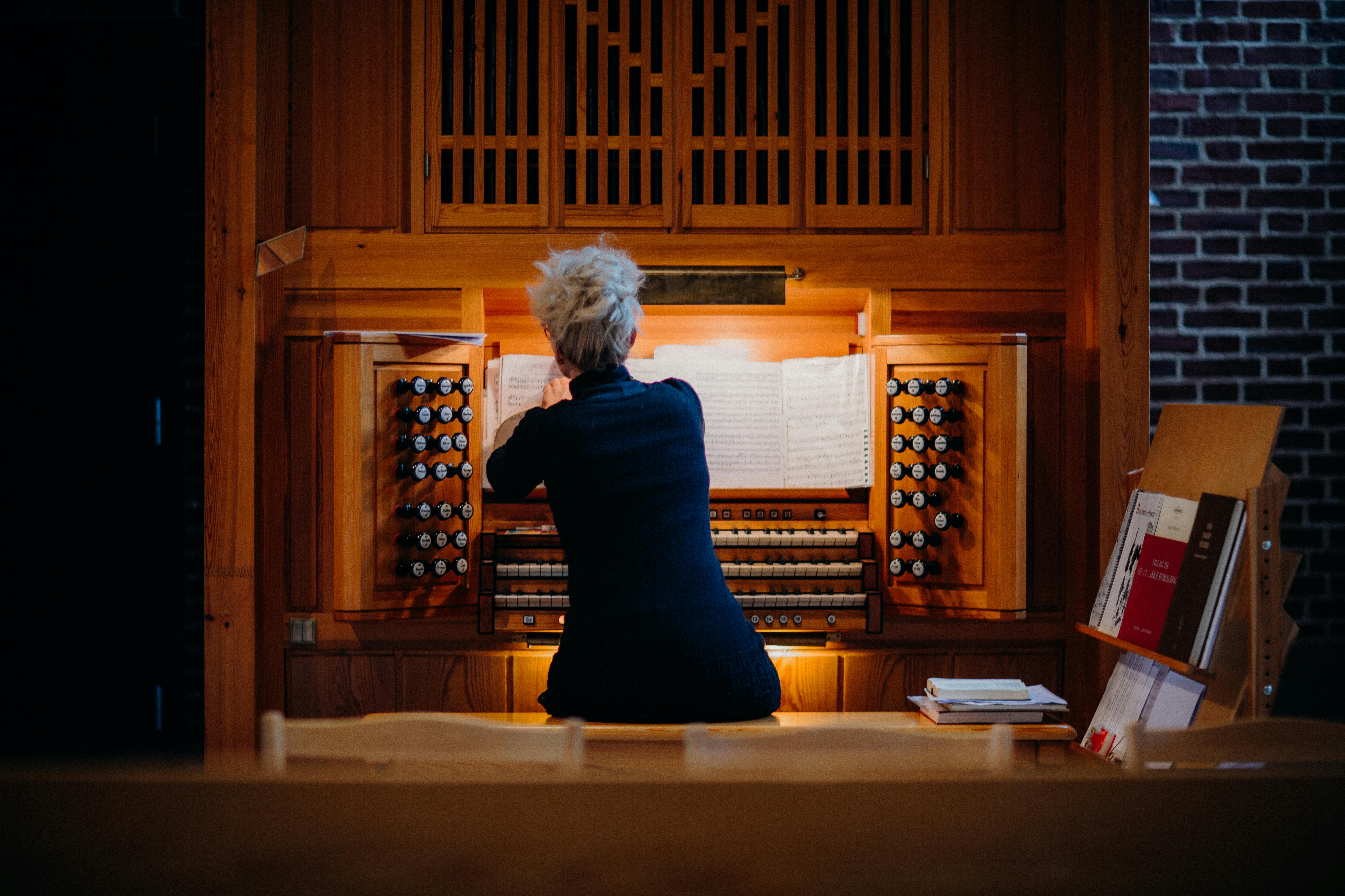 Woman Playing Pipe Organ · Free Stock Photo