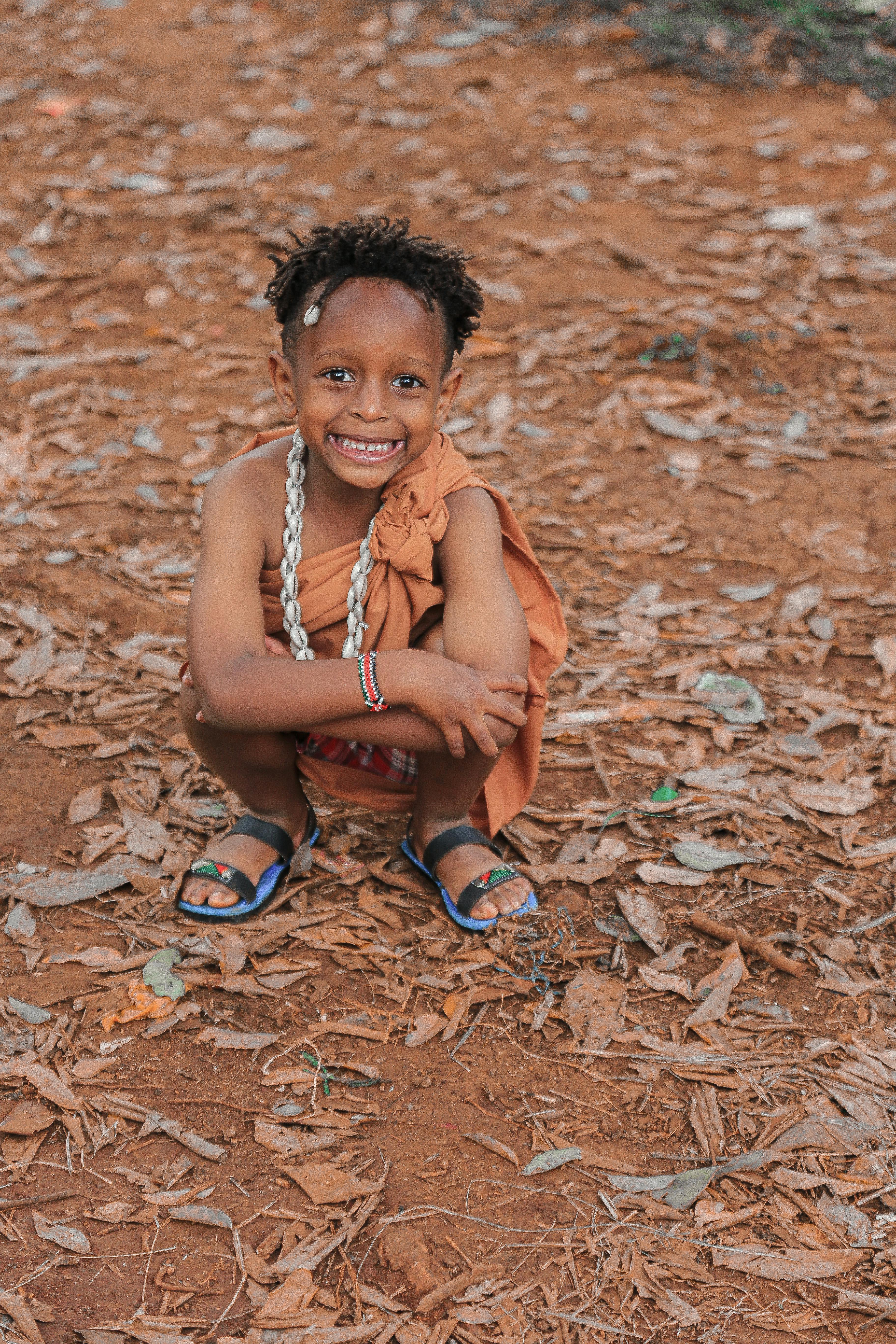 A Kid Flashing a Toothy Smile · Free Stock Photo