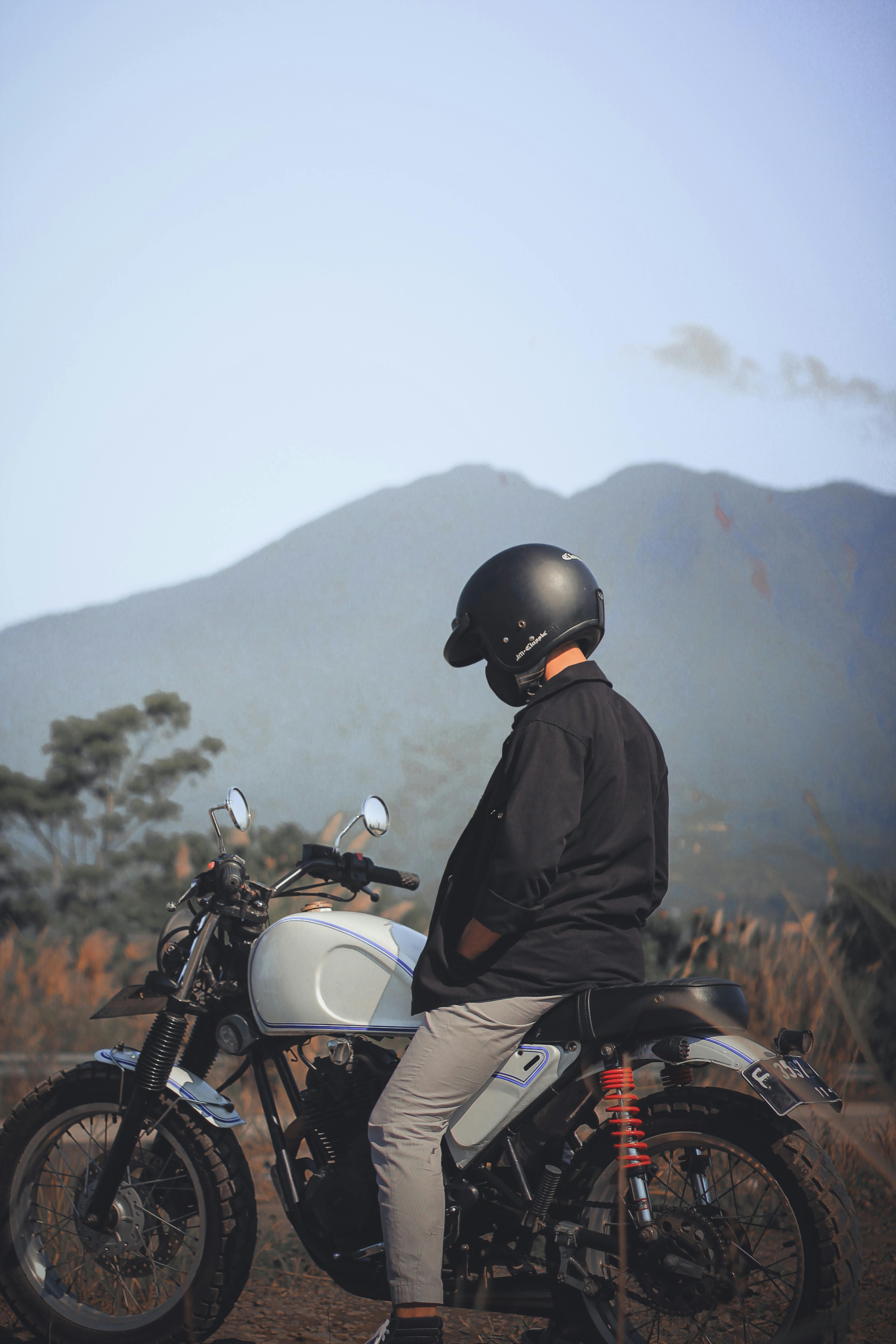 Two Men Riding a Motorcycle · Free Stock Photo