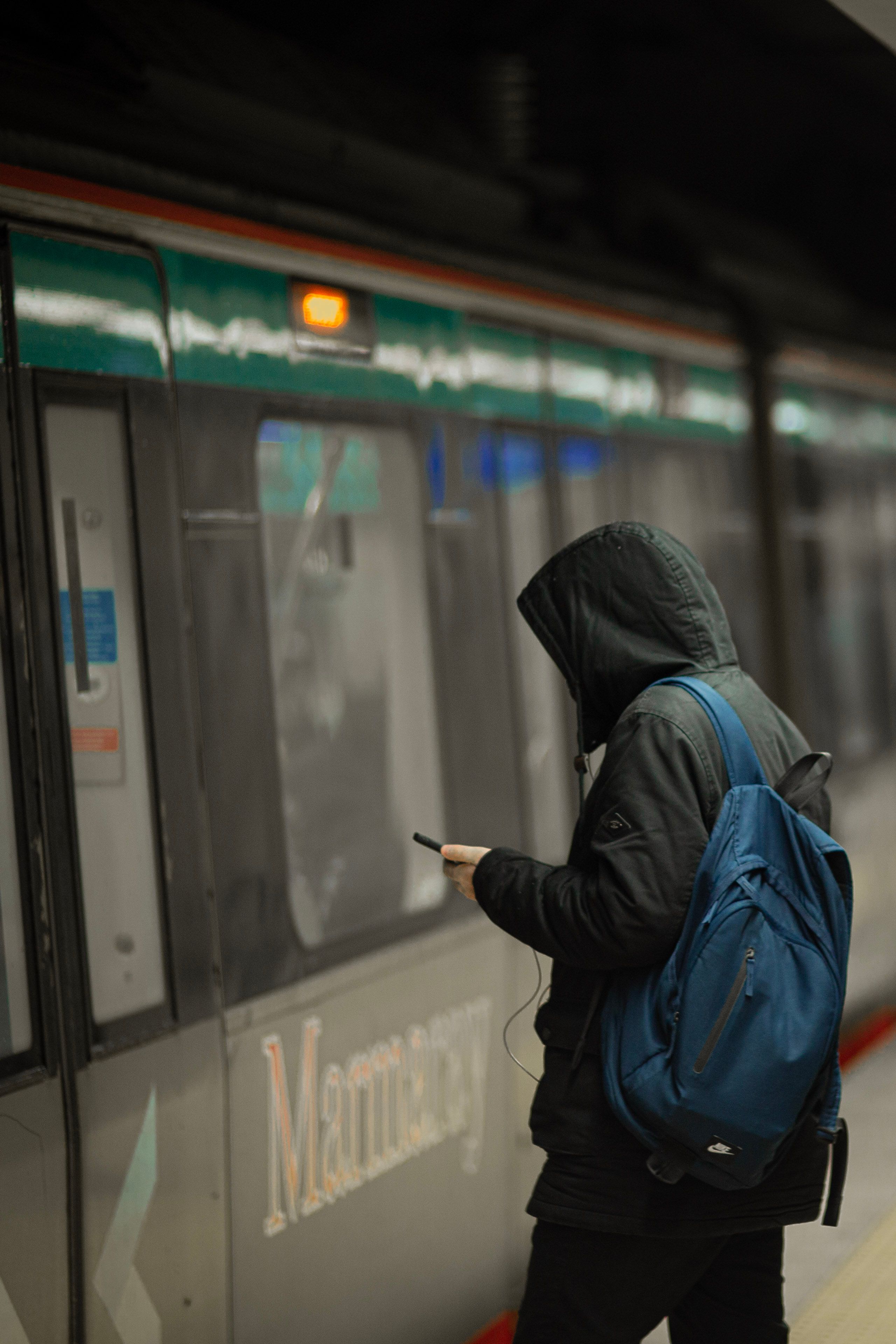 Photo of People Waiting in a Train Station · Free Stock Photo