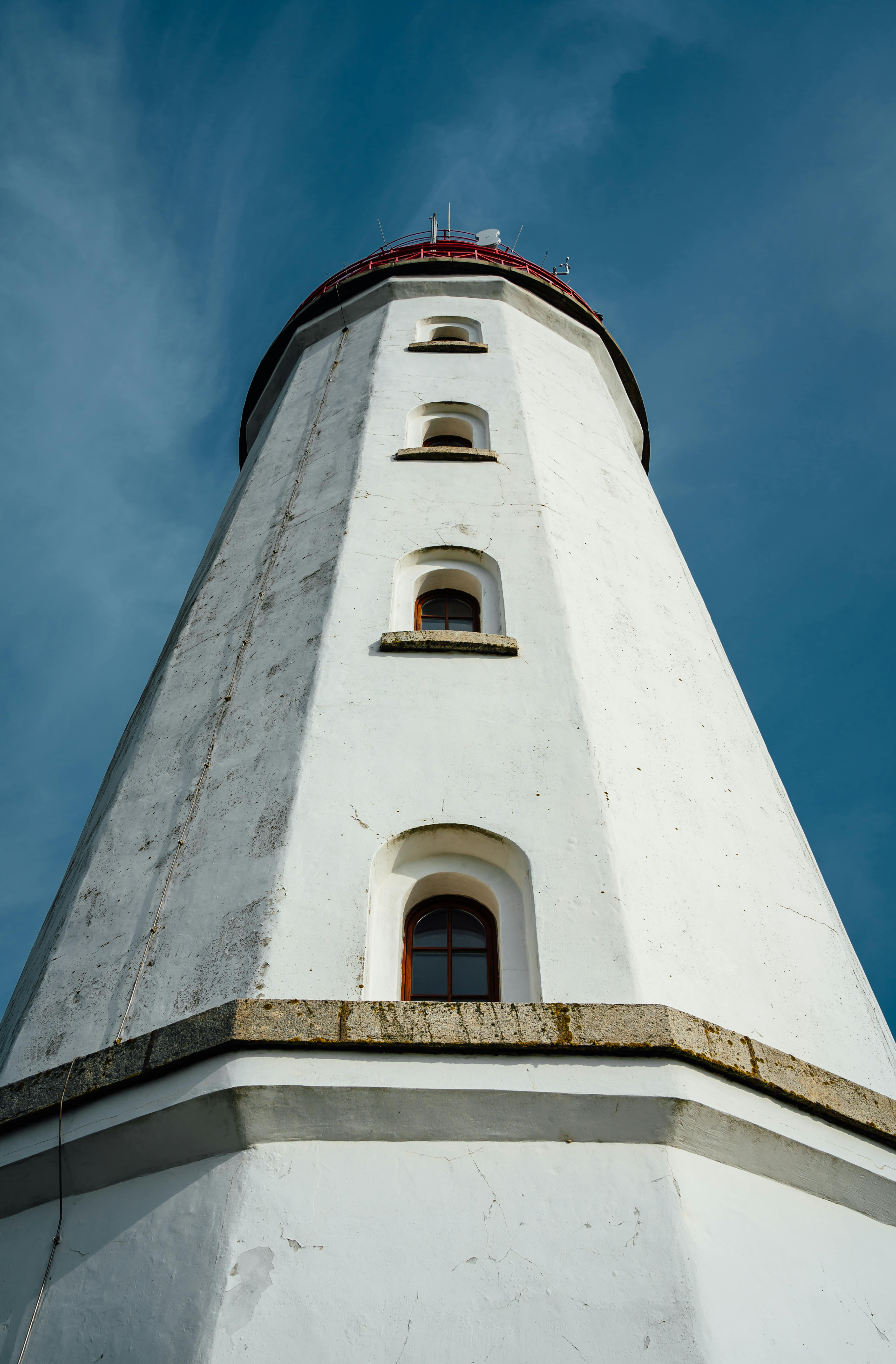 White Lighthouse Under Blue Sky · Free Stock Photo