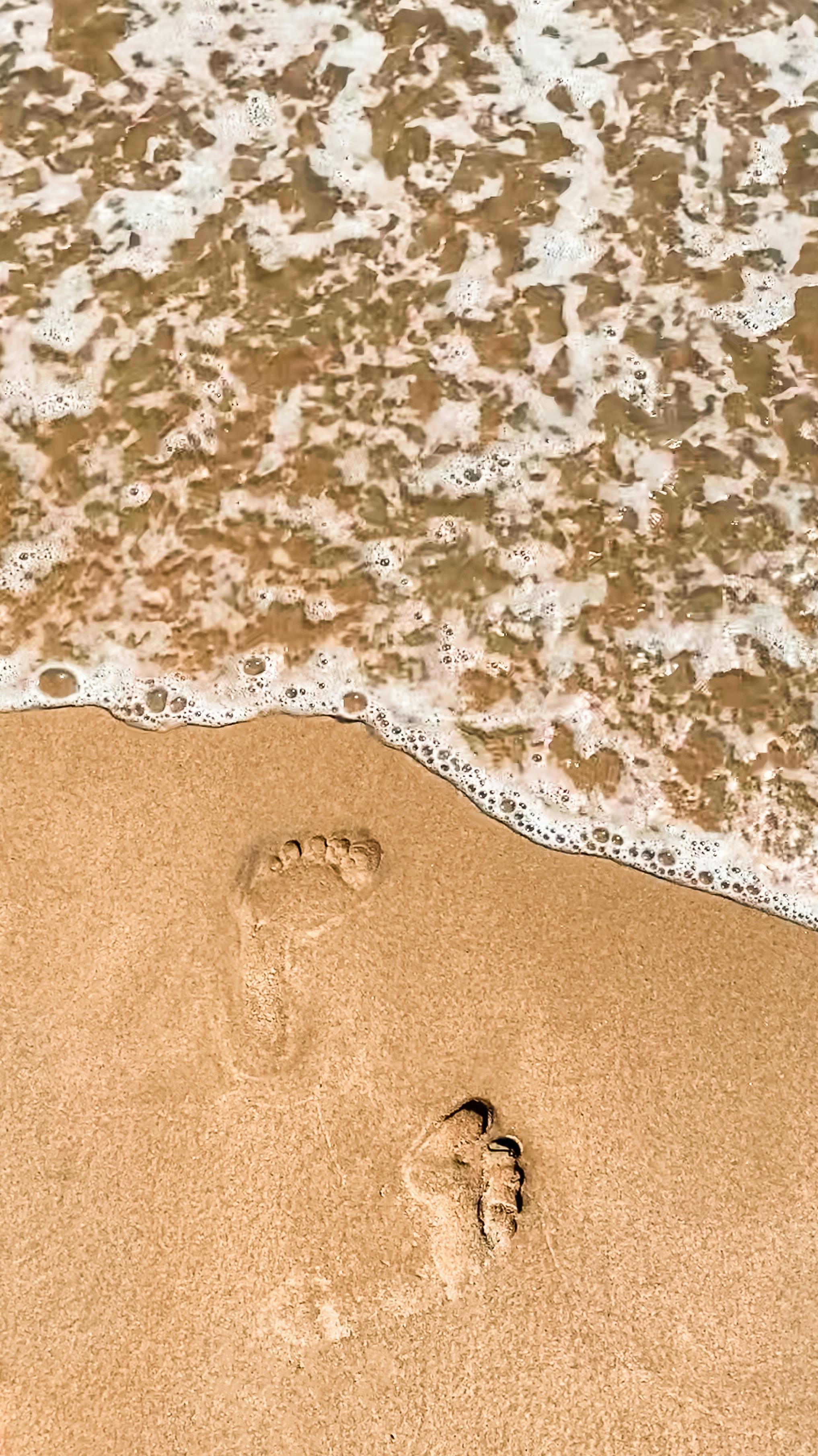Footprints On Sand · Free Stock Photo